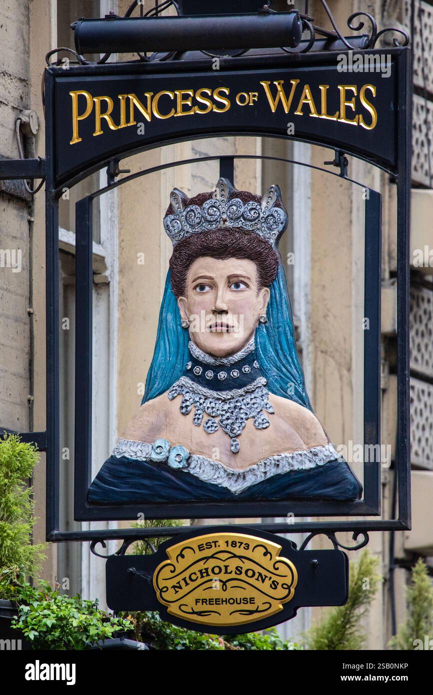 London, UK - July 1st 2024: The traditional hanging sign on the ...
