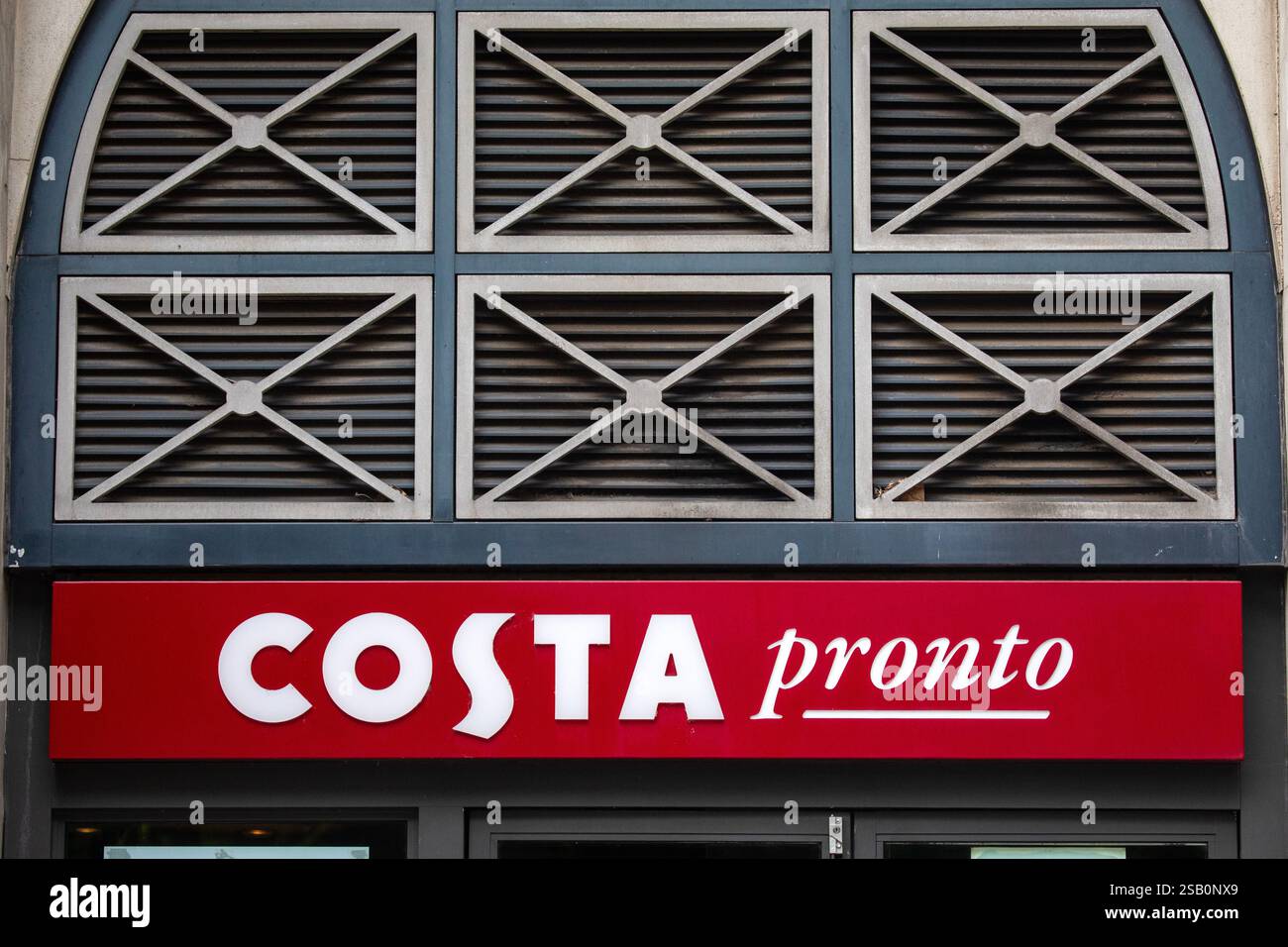London, UK - July 1st 2024: The sign above the entrance to a Costa ...