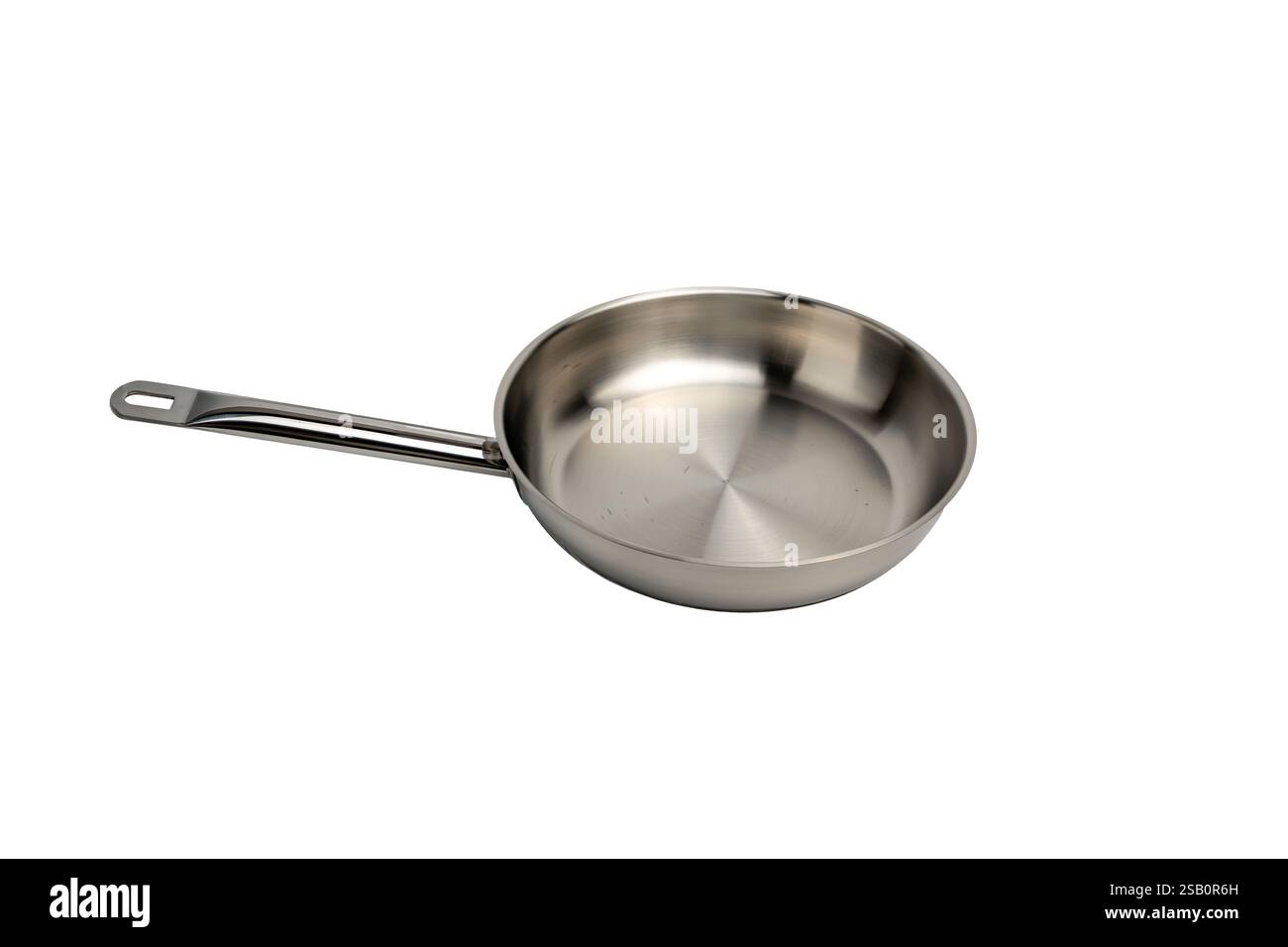 A silver pan with a handle. The pan is sitting on a white background ...