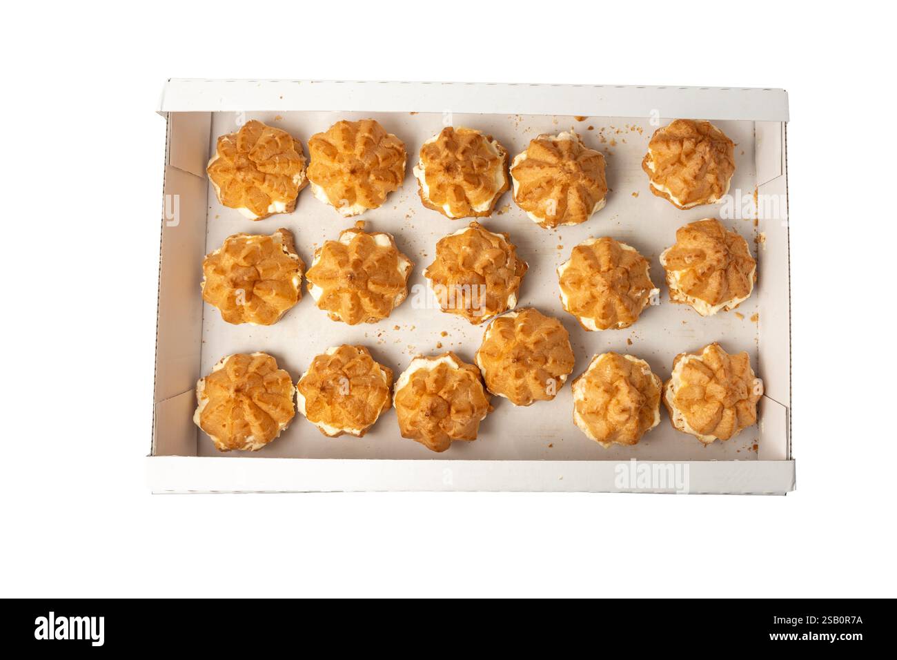 A box of pastries with a white background. The pastries are small and ...