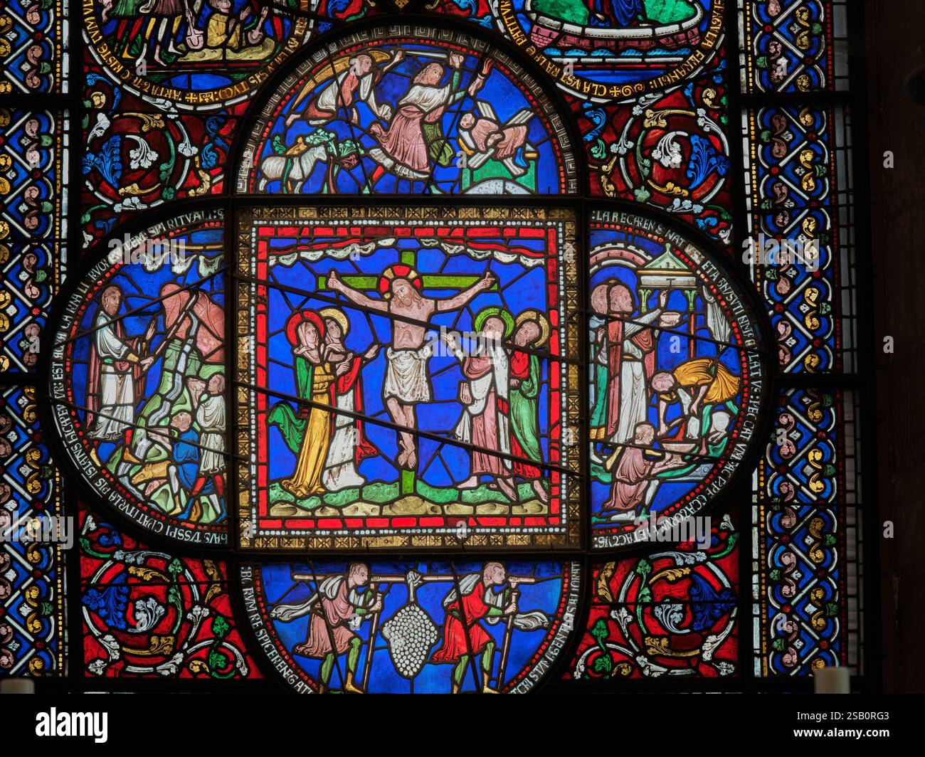 Medieval stained glass window (featuring the crucifixion of Jesus ...