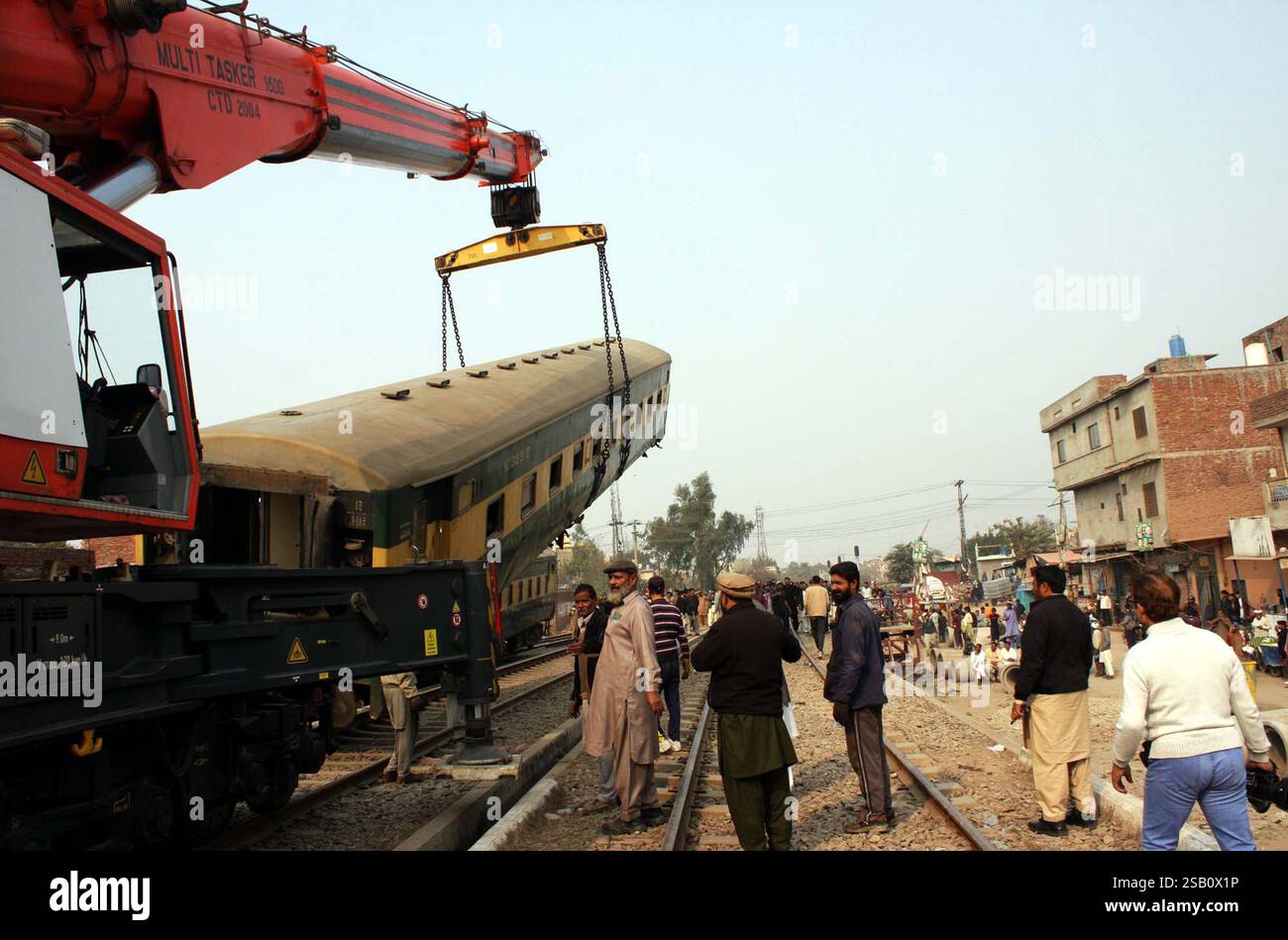 View of site after a train derailed as rescue operation is underway ...