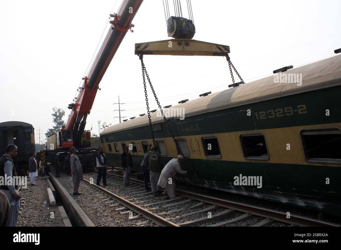 View of site after a train derailed as rescue operation is underway ...