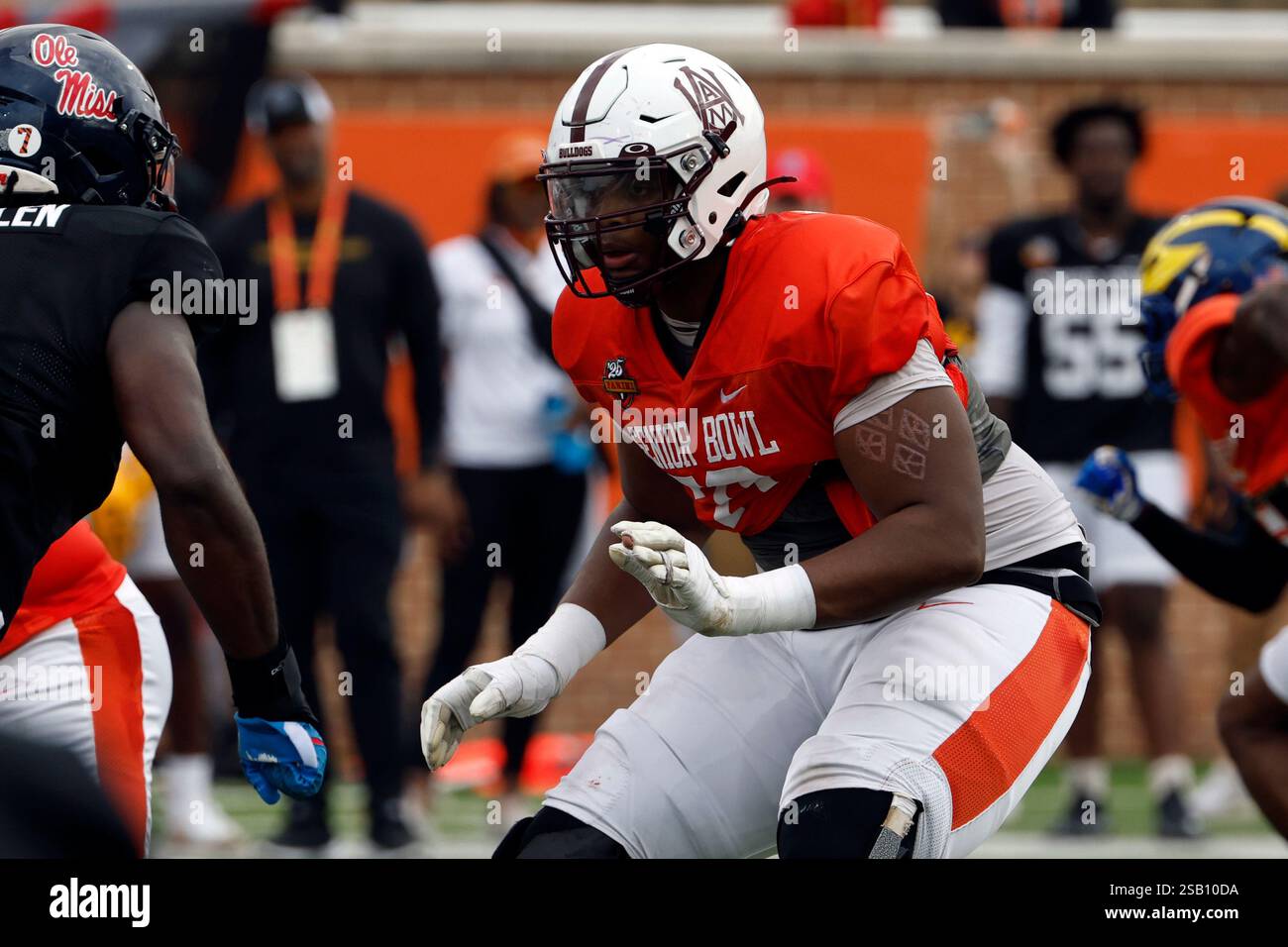 American team offensive lineman Carson Vinson of Alabama A&M (76) runs ...