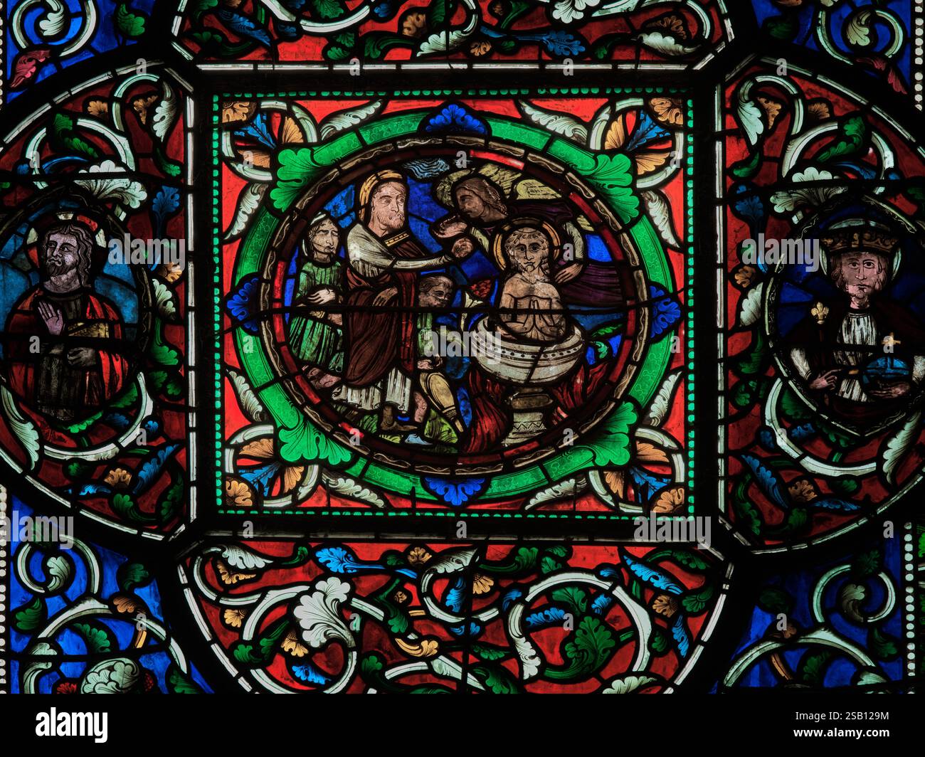 Medieval stained glass window, of John Baptist baptising Jesus, in the ...