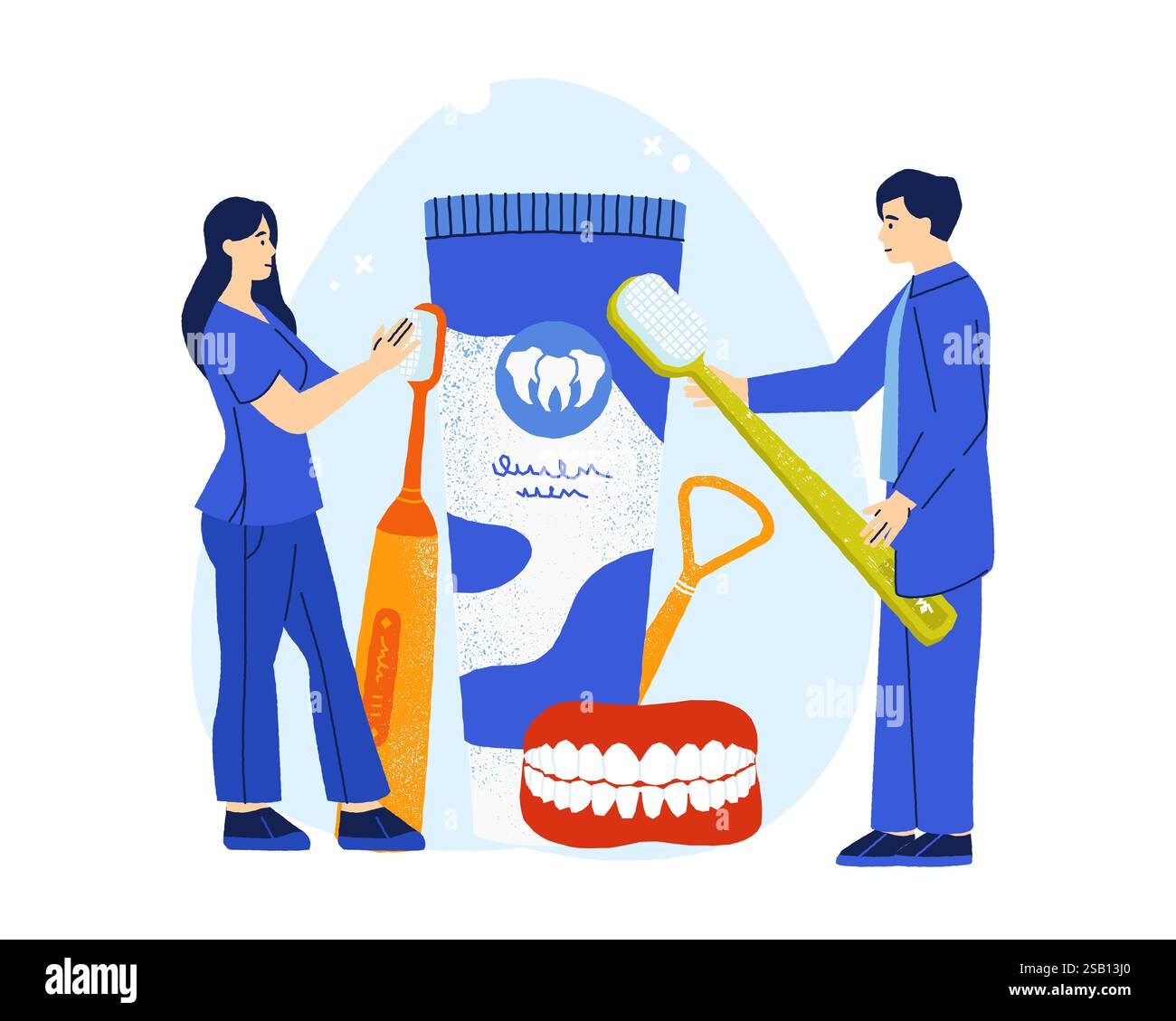 Dentist and nurse holding large toothbrushes alongside a giant ...