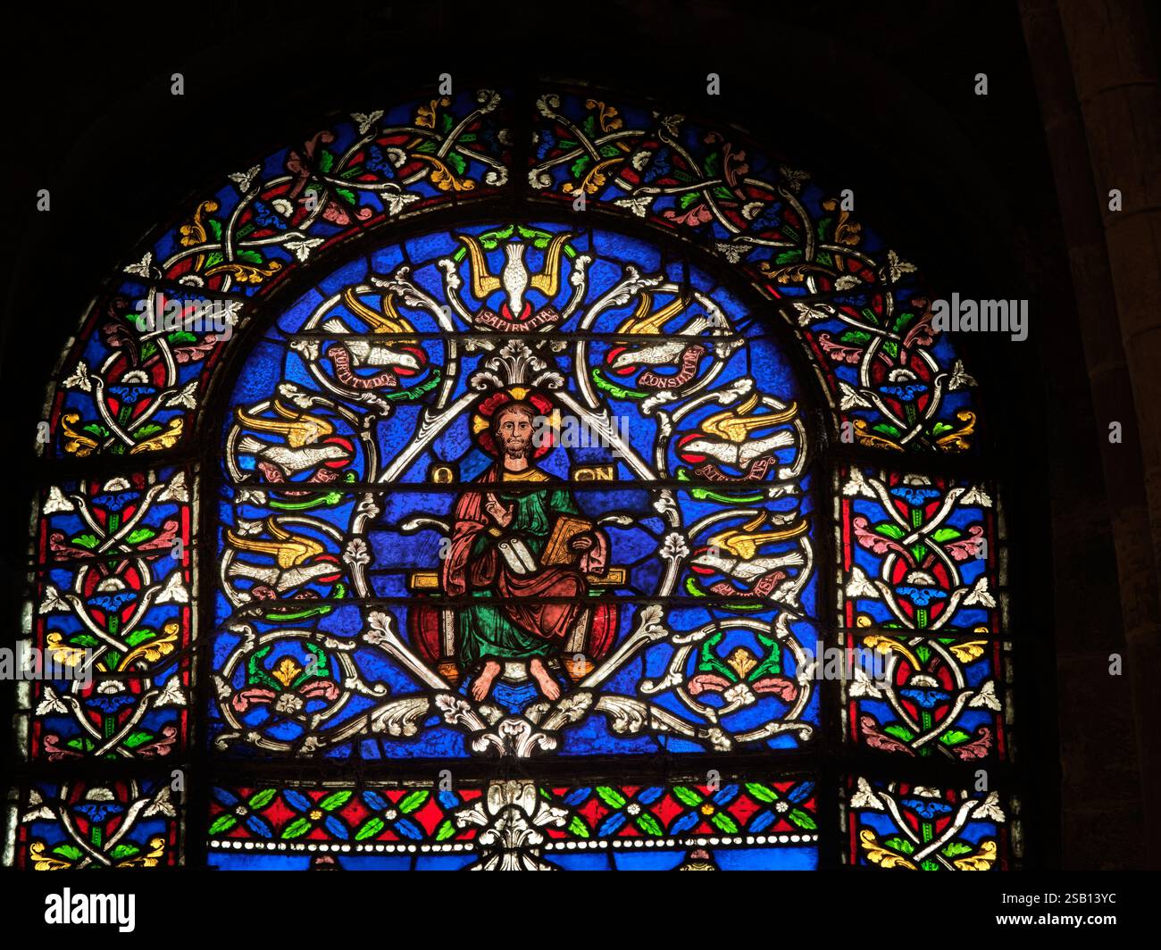 Medieval stained glass window, of Jesus Christ surrounded by the 7 ...