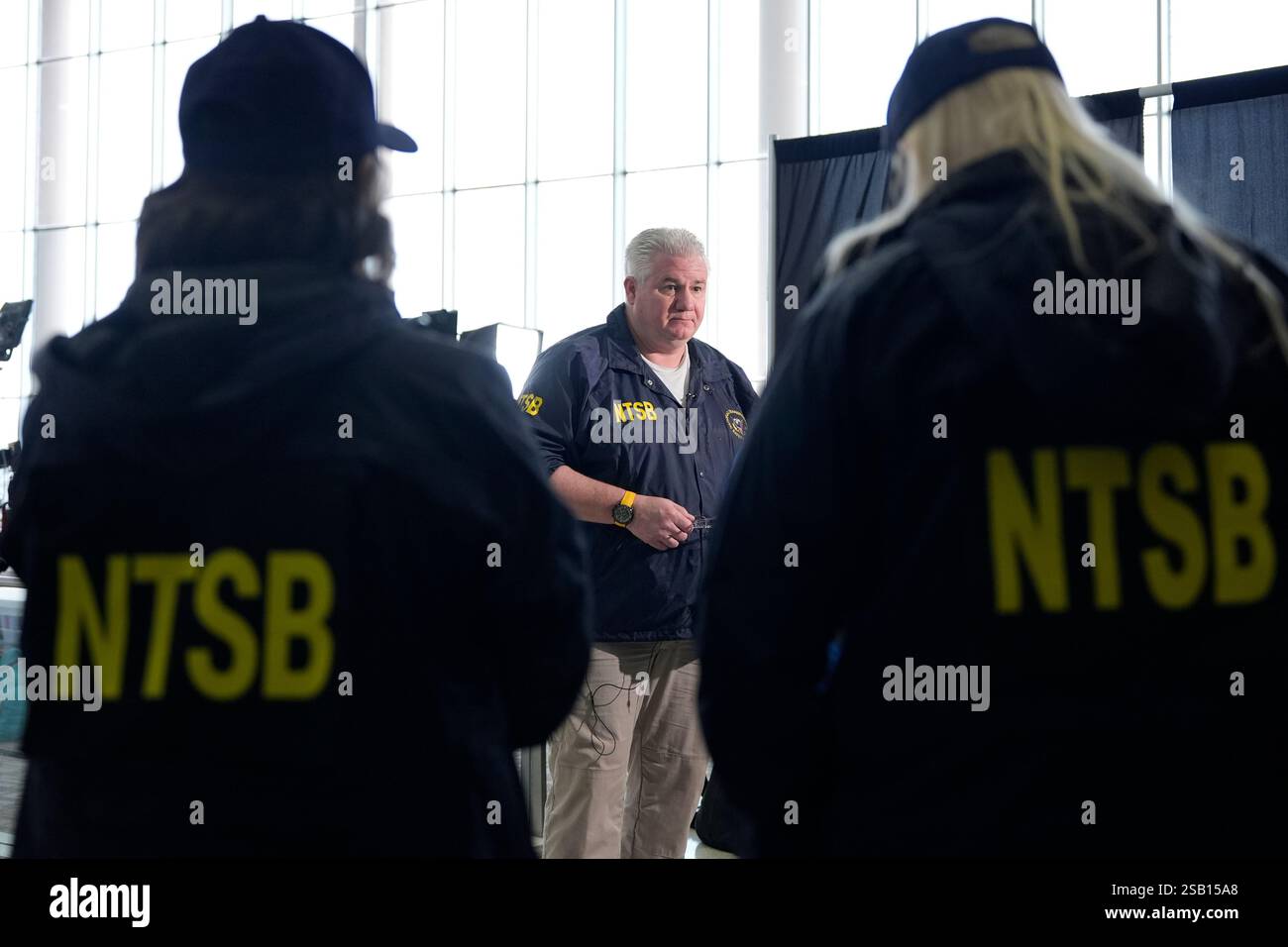 National Transportation Safety Board member Todd Inman speaks with ...