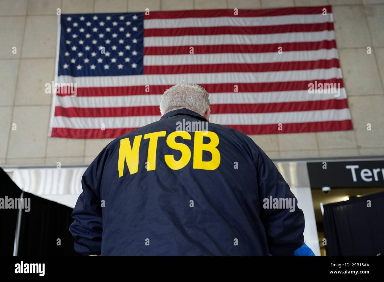 National Transportation Safety Board member Todd Inman speaks with ...