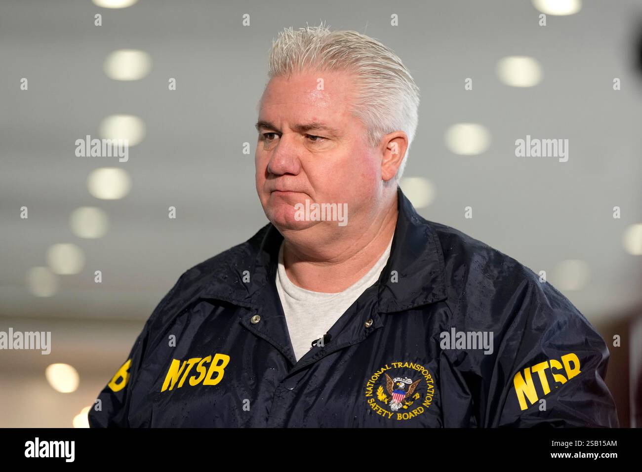 National Transportation Safety Board member Todd Inman speaks with ...