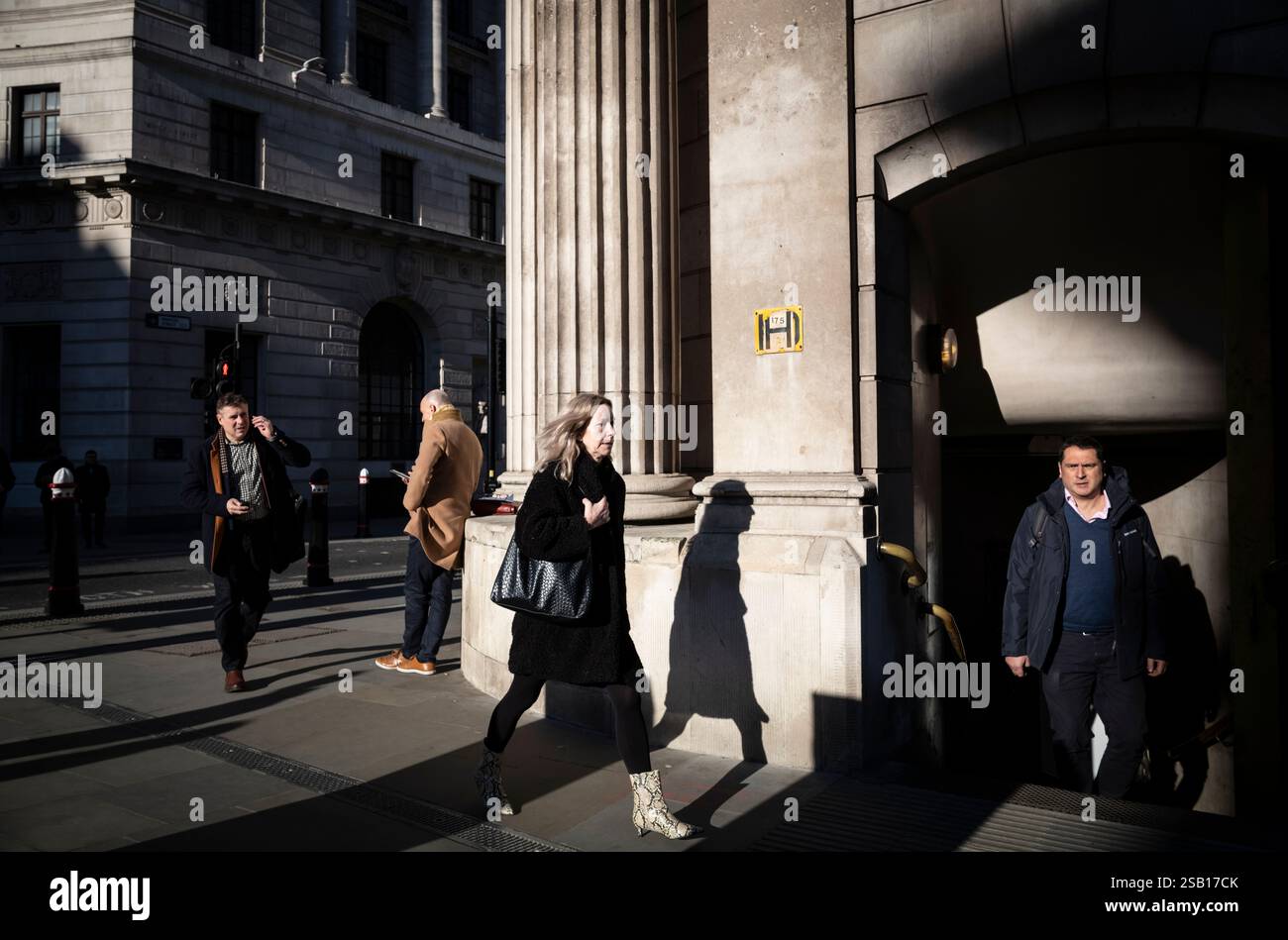 City of London workers in the financial district close to the Bank of ...