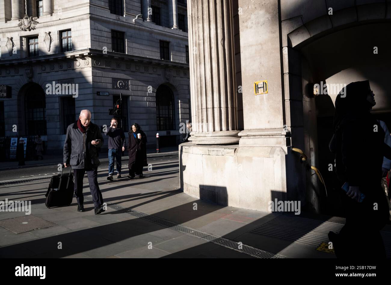 City of London workers in the financial district close to the Bank of ...