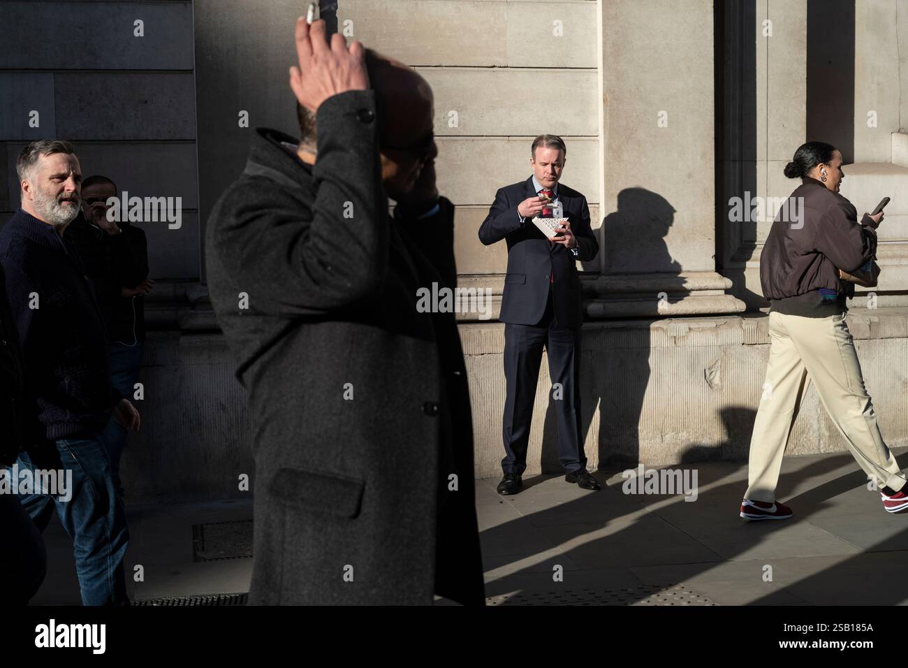 City of London workers in the financial district close to the Bank of ...