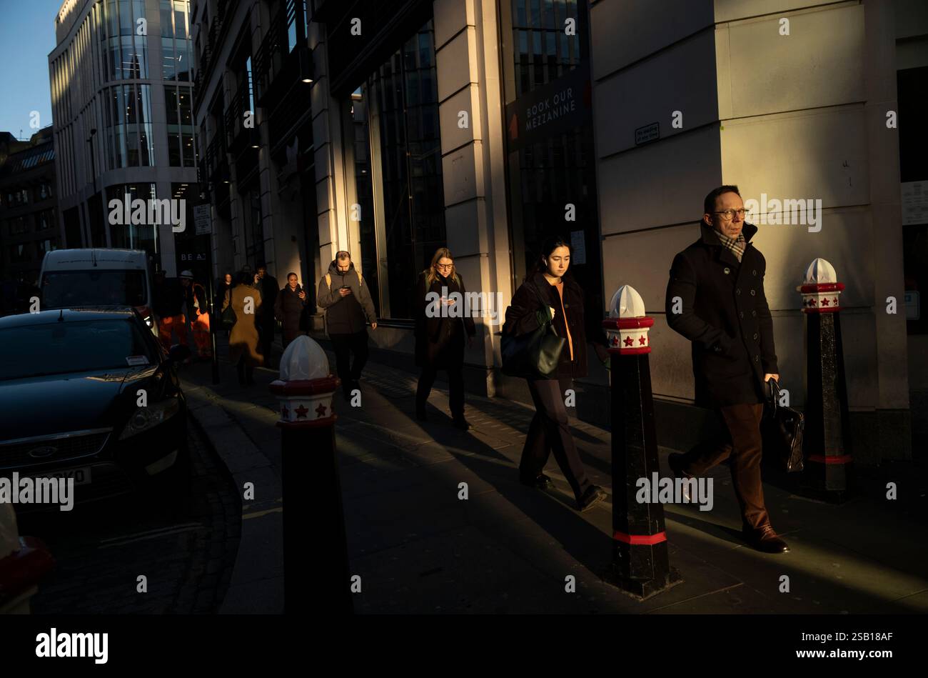 City of London workers at Monument in the early morning for another ...