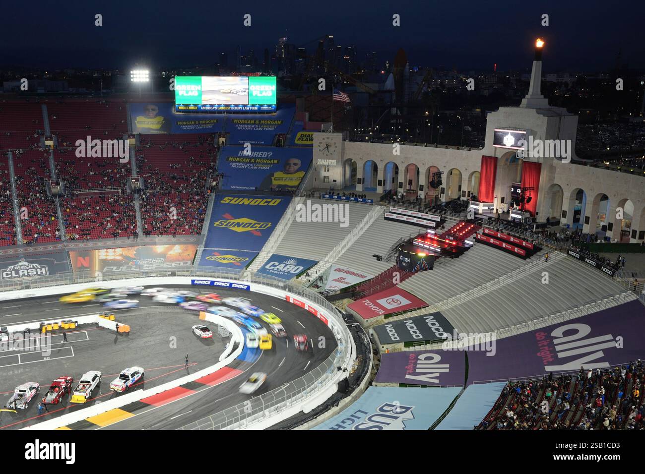 FILE - Cars race during the Busch Light Clash NASCAR exhibition auto ...