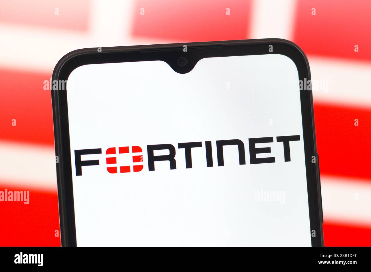 In this photo illustration, the Fortinet, Inc. logo is seen displayed on a smartphone screen ...