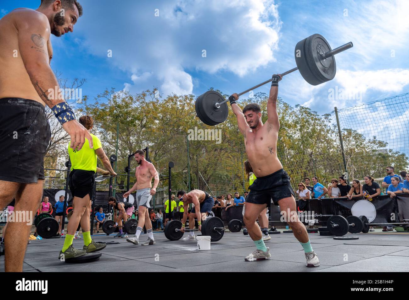 Seville, Spain, Nov 9 2024, Athletes engage in a high-energy Crossfit ...