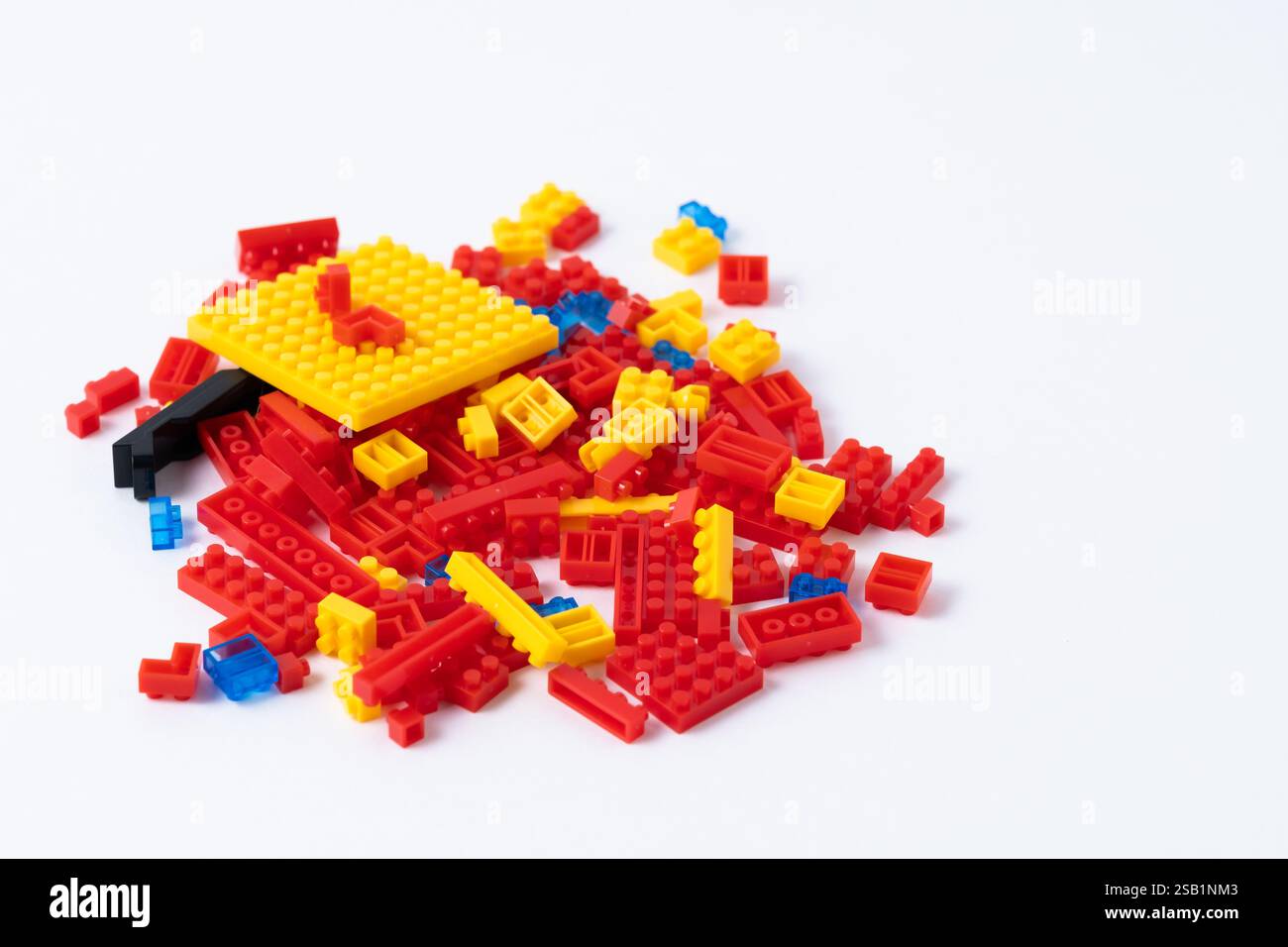 Children construction kit. Plastic building blocks isolated on white ...