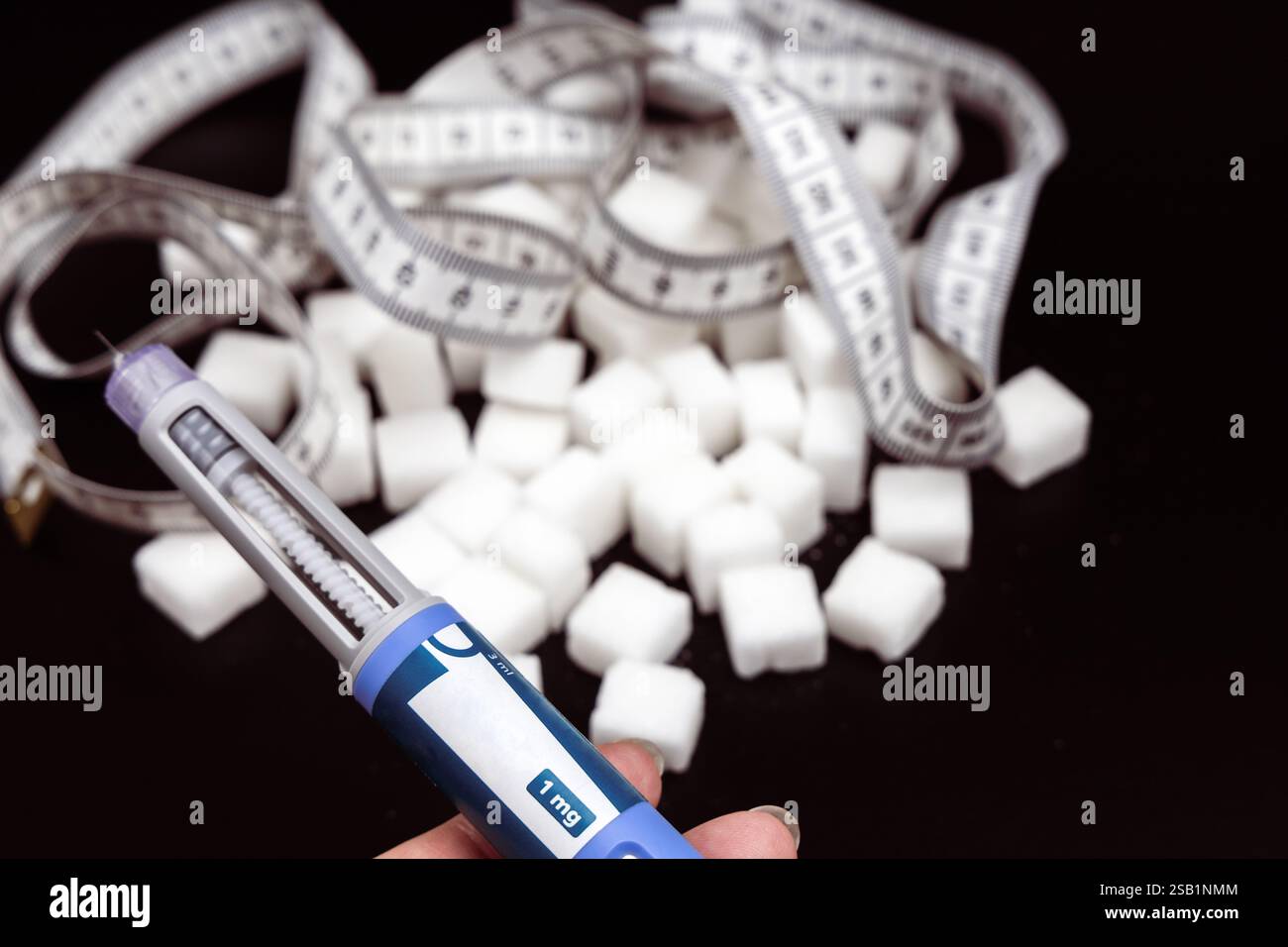 Ozempic Insulin injection pen on a dark background for diabetics and weight loss Stock Photo - Alamy