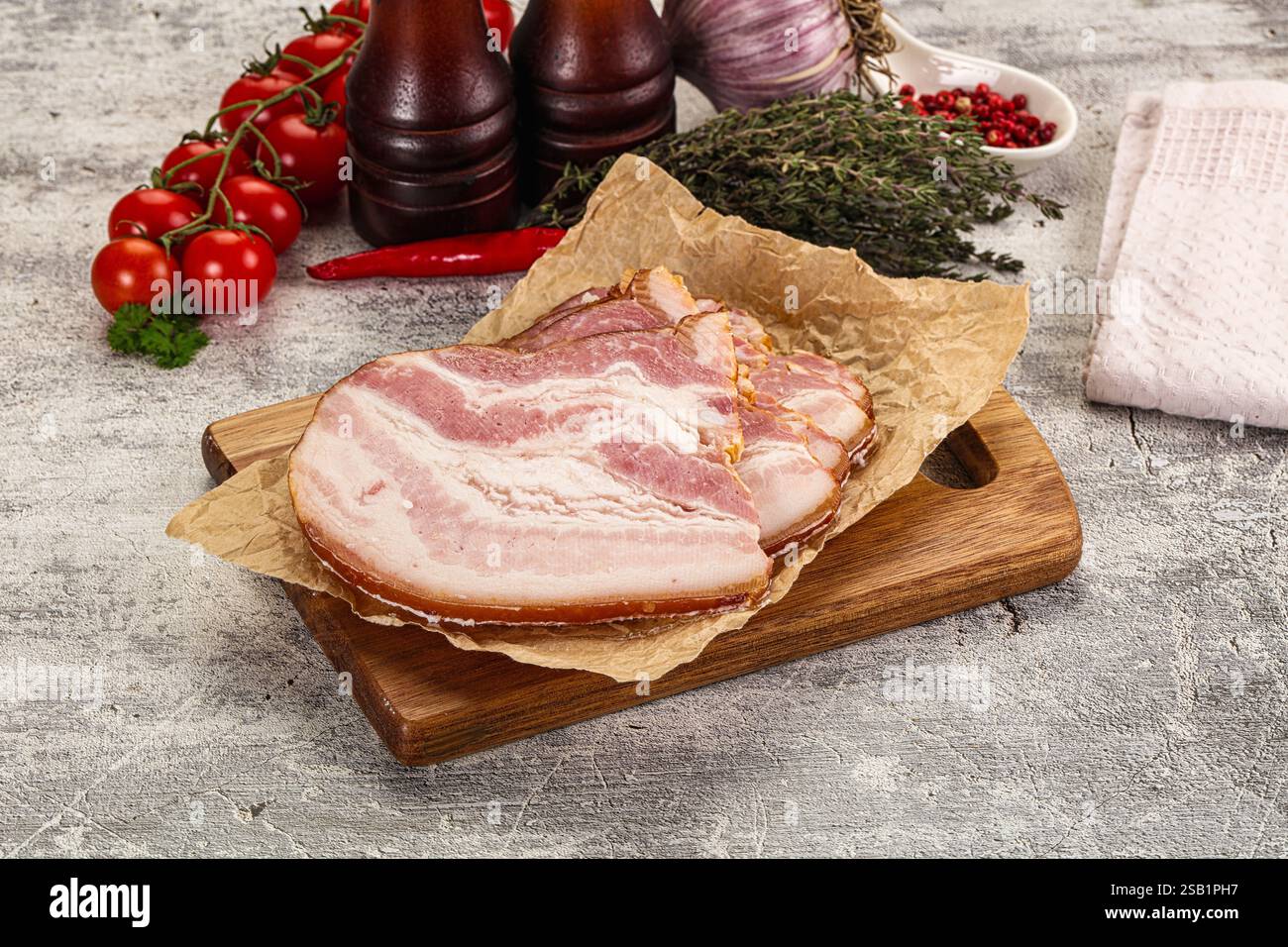 Smoked pork belly slices fat snack Stock Photo - Alamy
