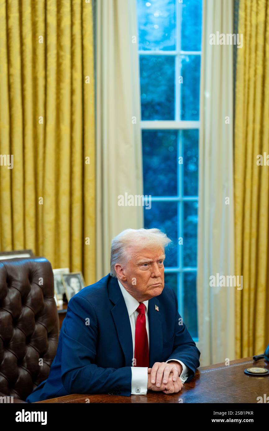 United States President Donald Trump signs two executive orders in the ...