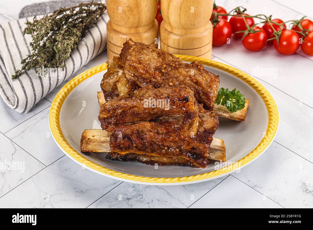 Baked beef ribs with marinade with seasoning Stock Photo - Alamy