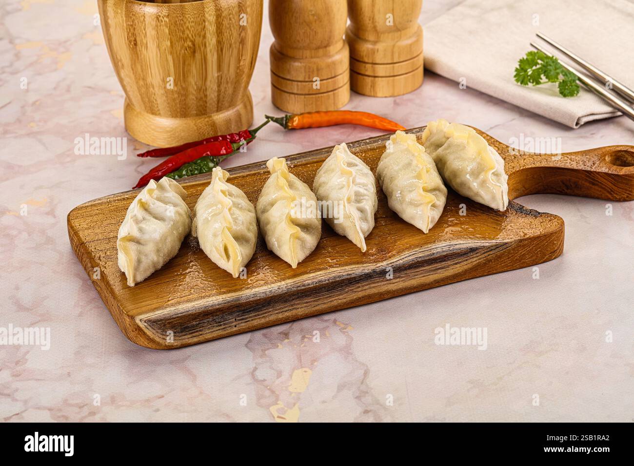 Japanese steamed Gyoza - traditional stuffed dumplings Stock Photo - Alamy