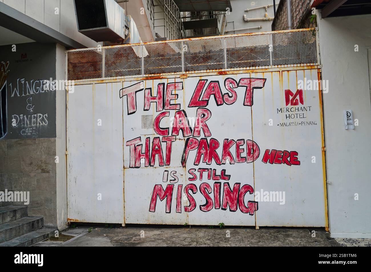 Whimsical No Parking Sign on the gate of the Merchant Hotel with a ...