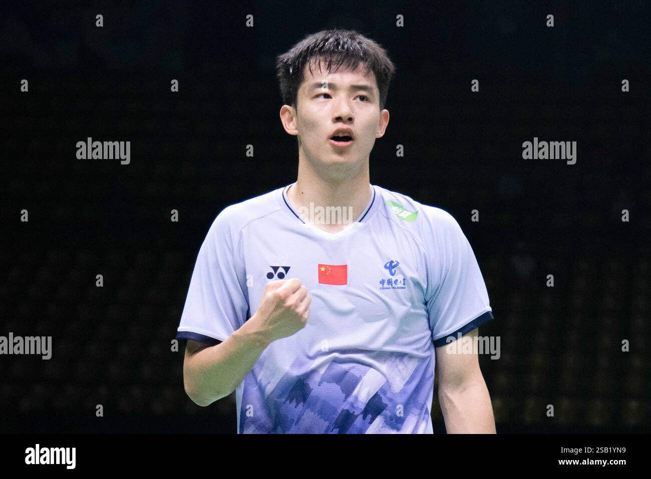 Wang Zheng Xing of China reacts during plays against Srikanth Kidambi of india (not pictured) in ...