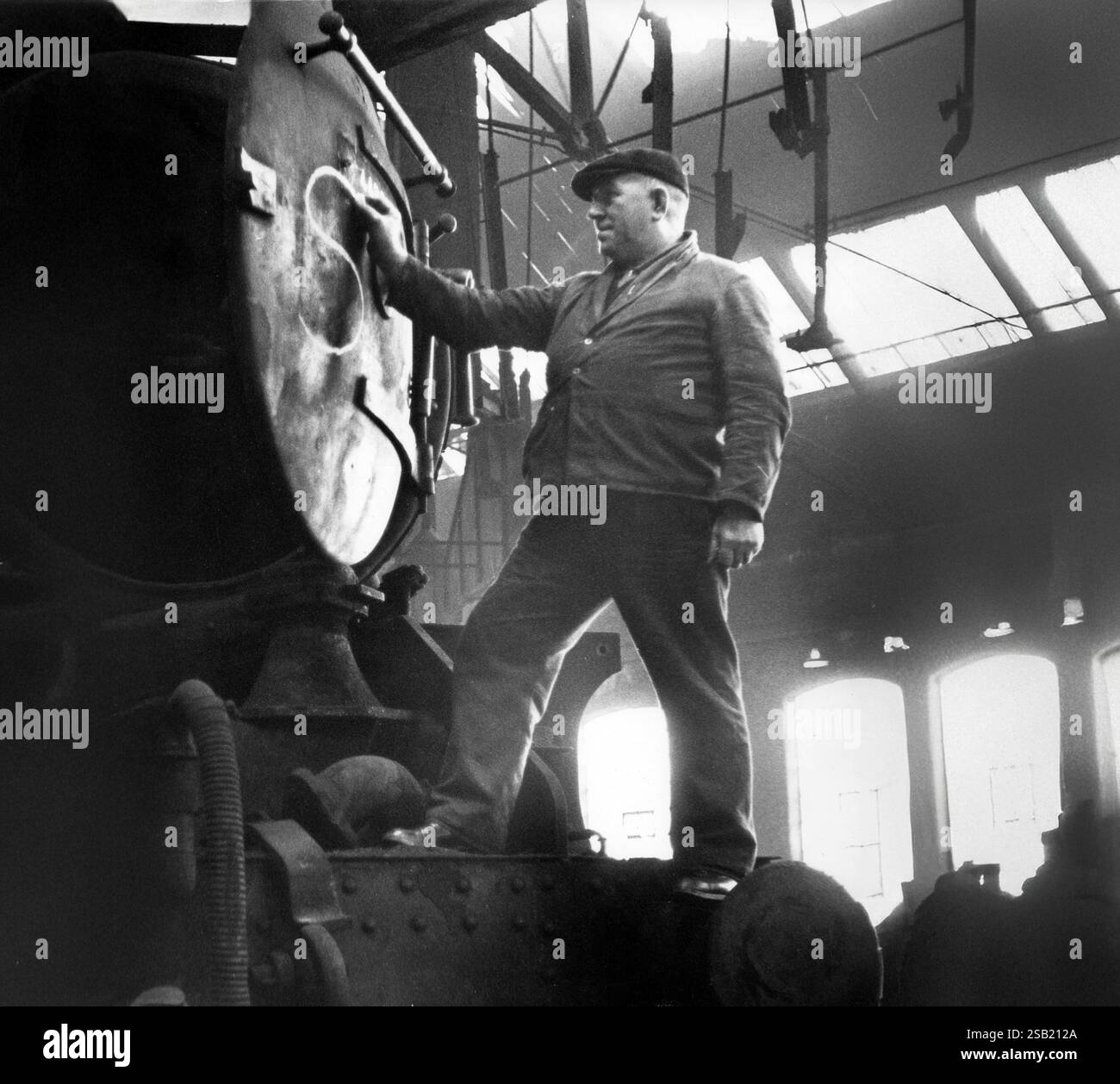 Railway worker writes S for Scrap on a Steam Locomotive at Oxley Sheds ...