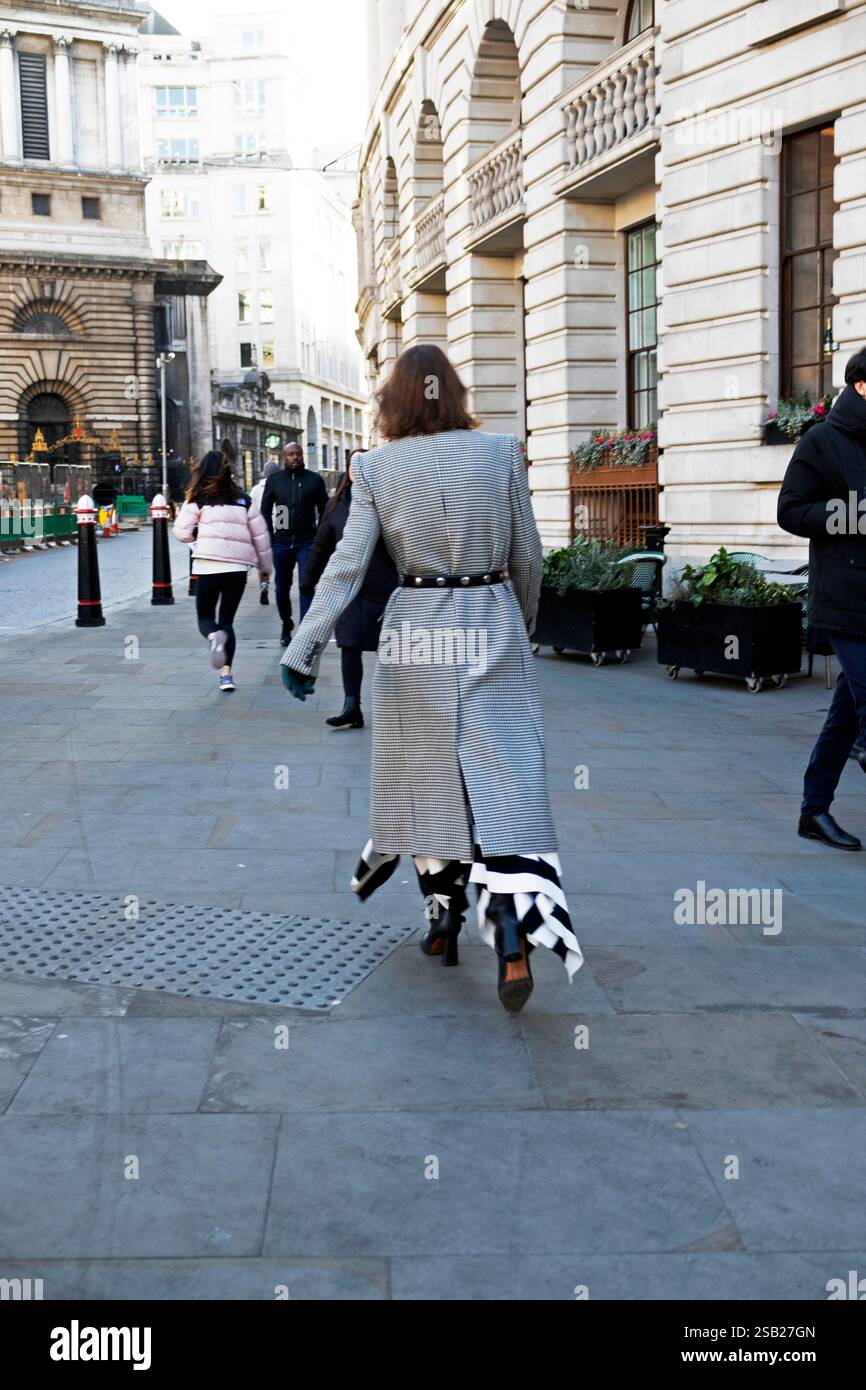 Woman belt coat rear view hi-res stock photography and images - Alamy