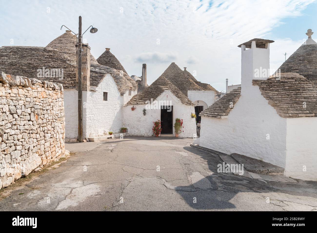 The trulli, typical limestone houses of the ancient village of ...