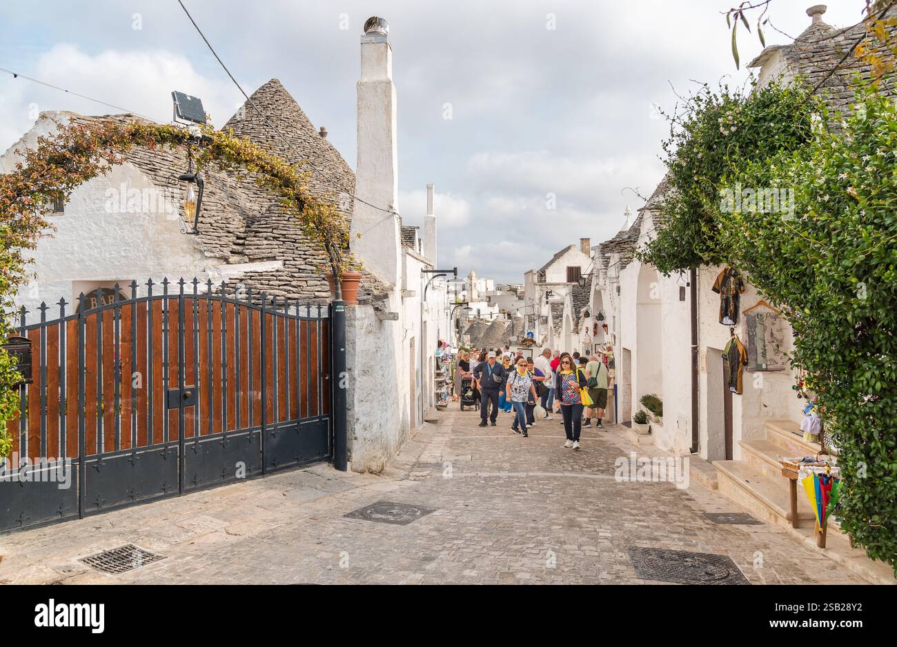 Alberobello, Puglia, Italy - October 5, 2023: Tourists visiting the ...