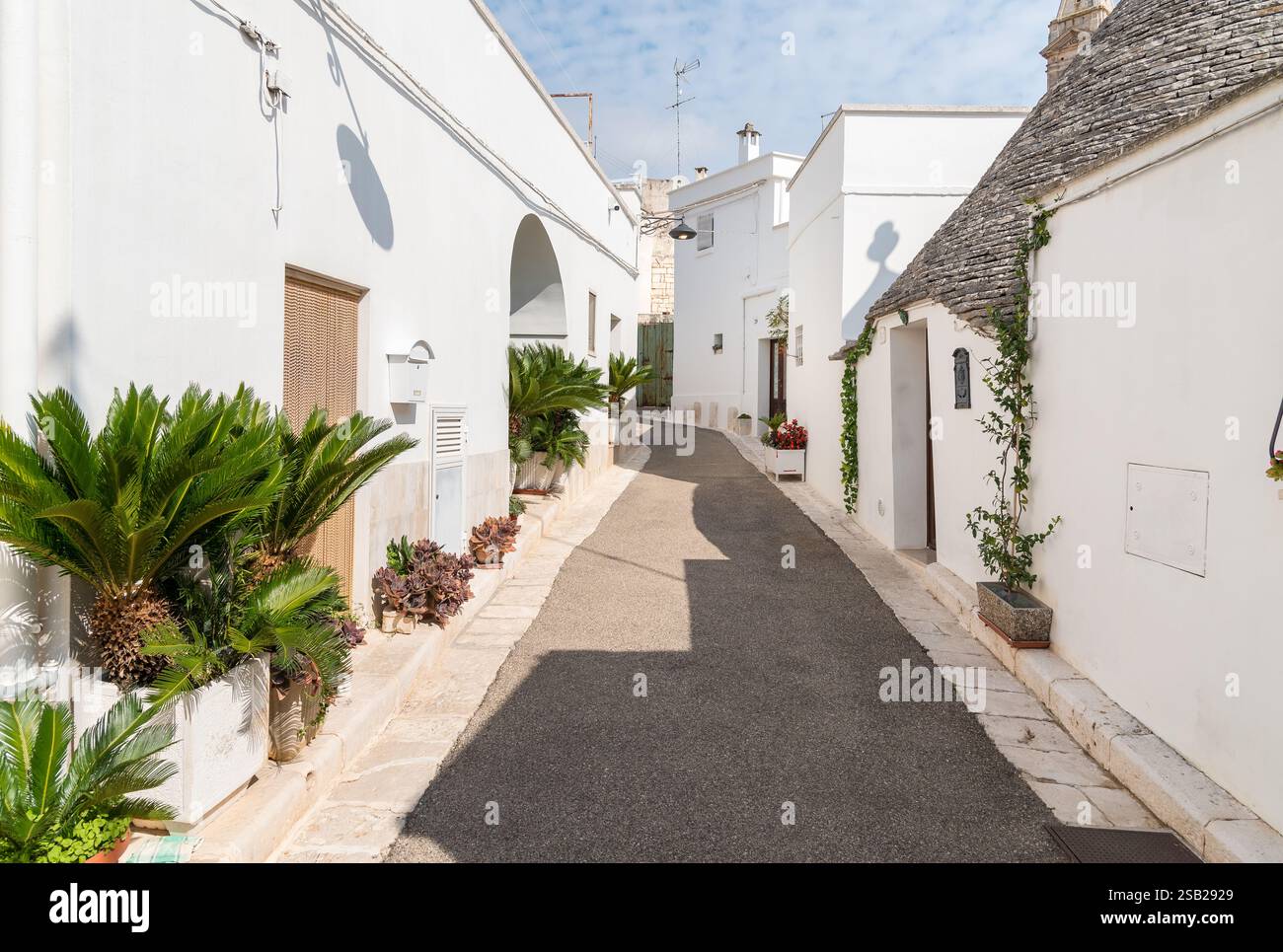 Street in the ancient village of Alberobello, in the province of Bari ...