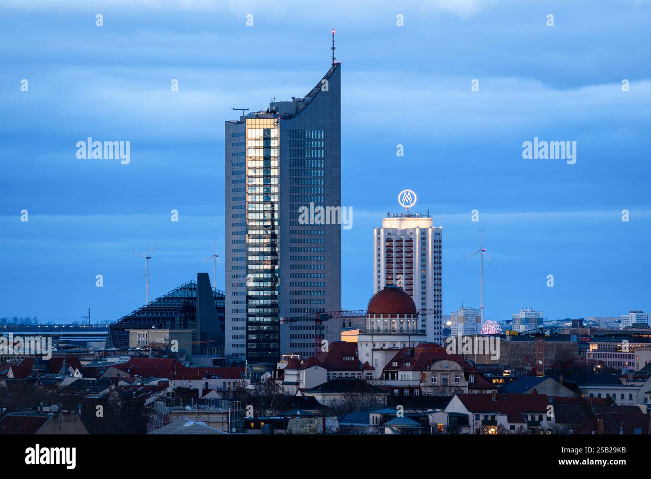 University tower and winter garden high-rise in the evening. Atmosphere ...