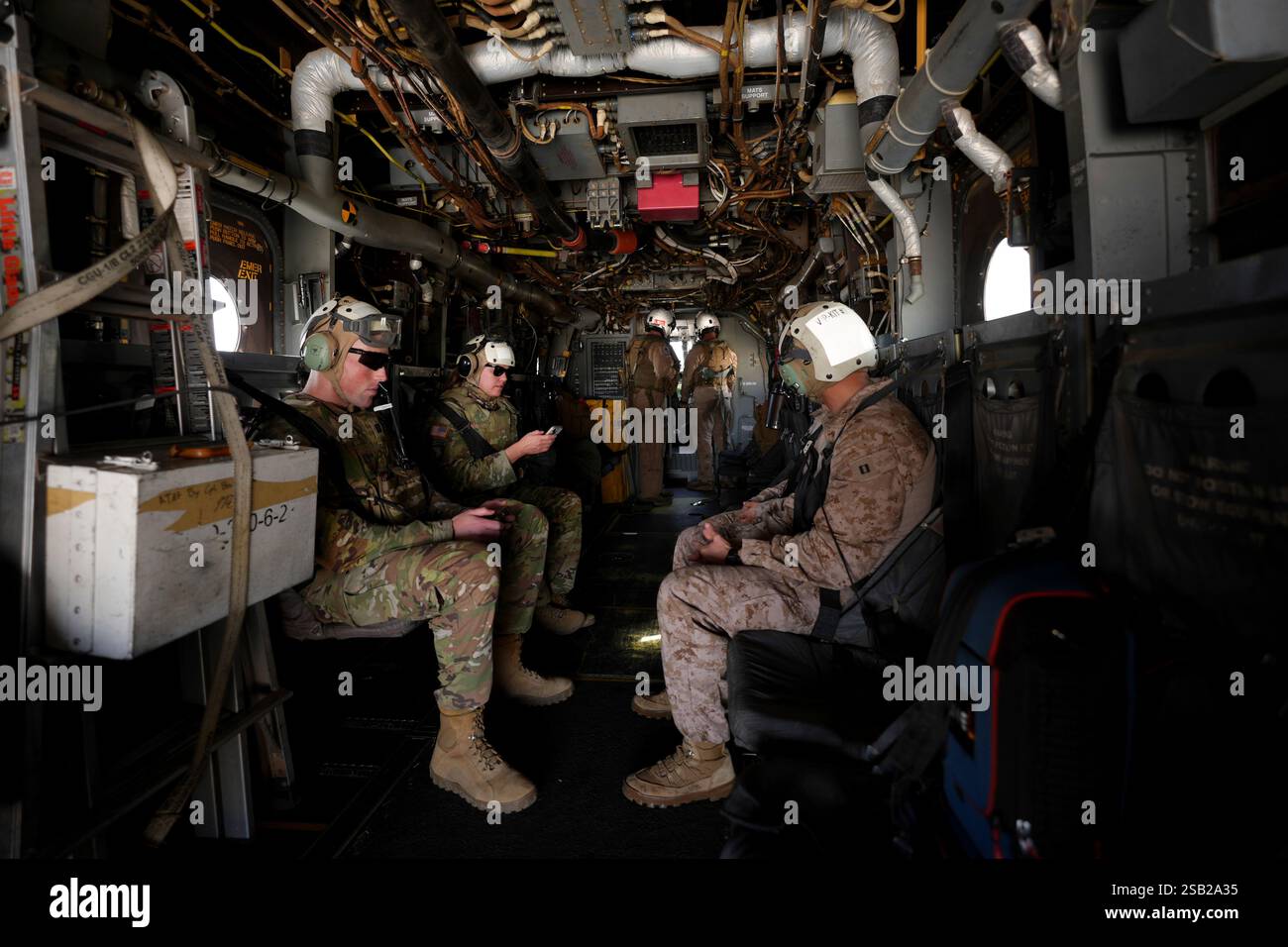 Military personnel board a U.S. Marine Osprey at the Naval Outlying ...