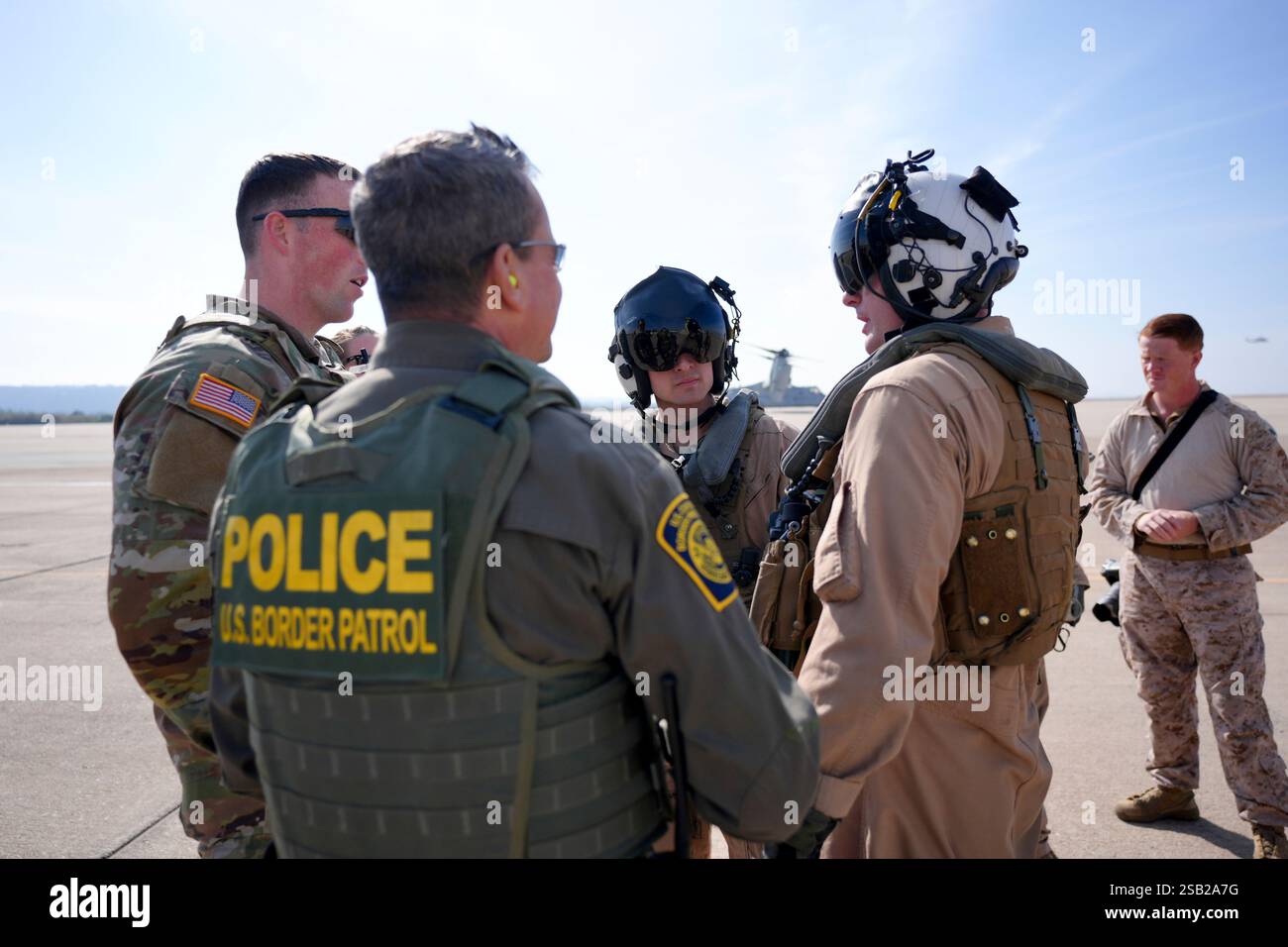 U.S. Marine pilots and U.S. Border Patrol agents interact at the Naval ...