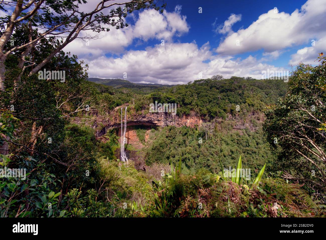 Island in ocean waterfalls hi-res stock photography and images - Alamy