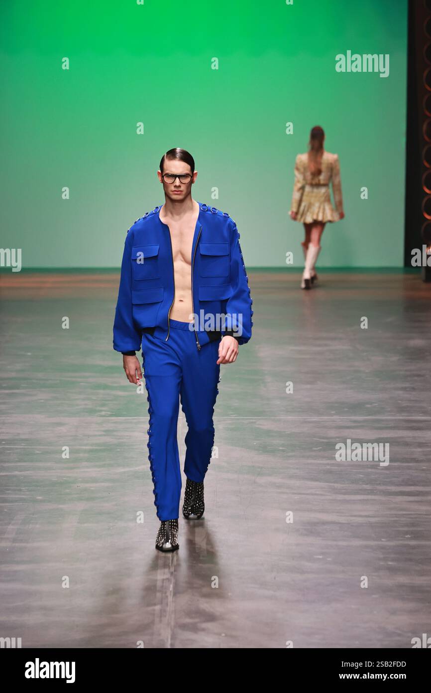 BERLIN, GERMANY - January 31: A model walks the runway during the ...