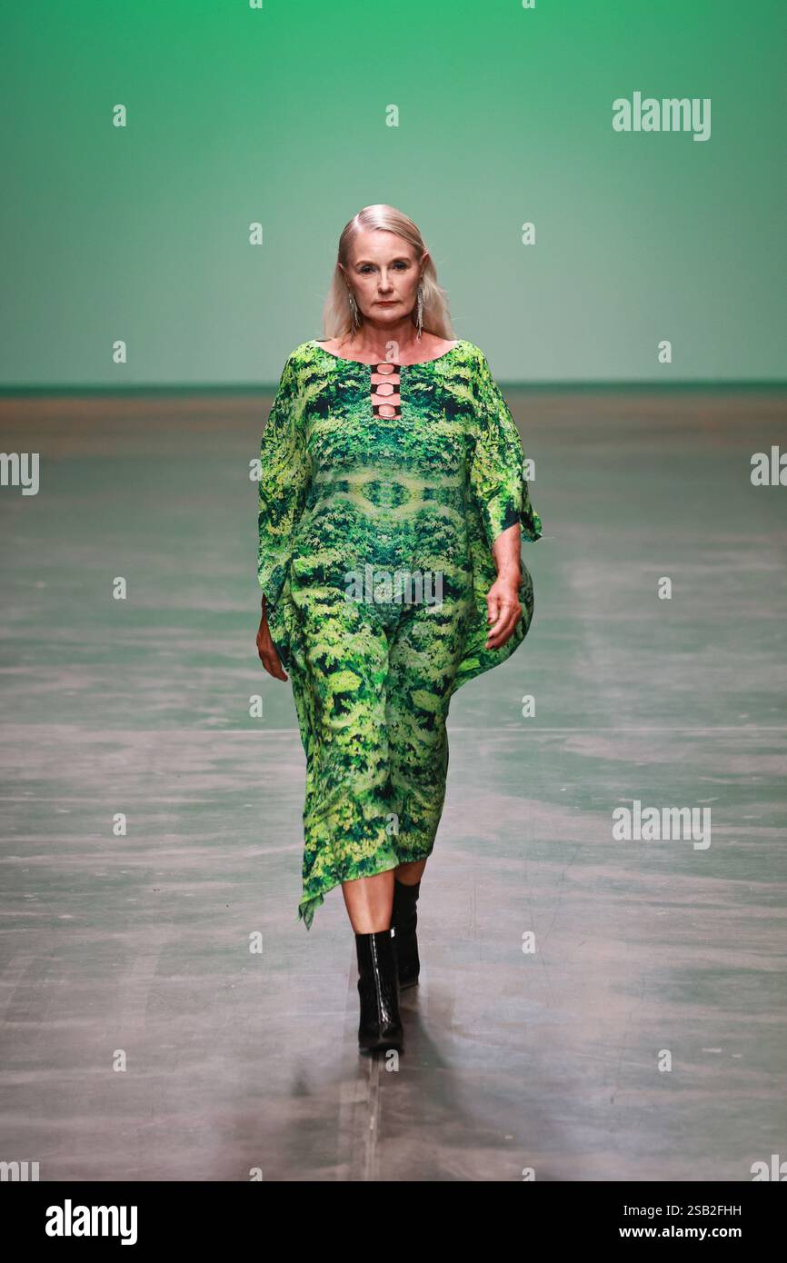 BERLIN, GERMANY - January 31: A model walks the runway during the ...