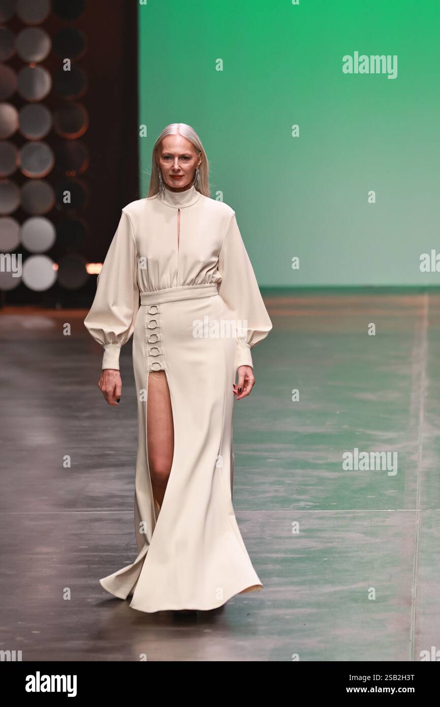 BERLIN, GERMANY - January 31: A model walks the runway during the ...