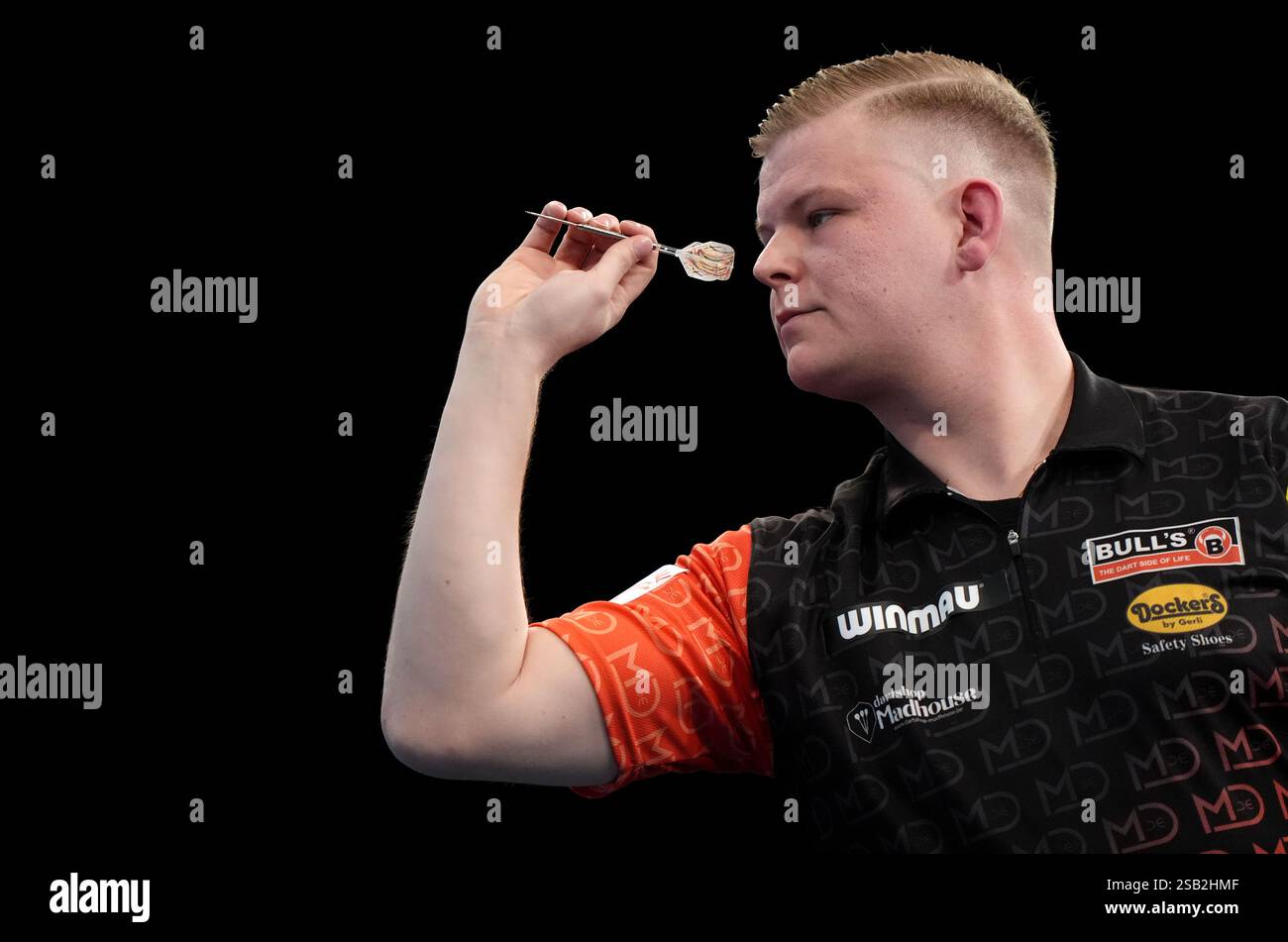 Mike De Decker during his first round match against James Wade on day ...
