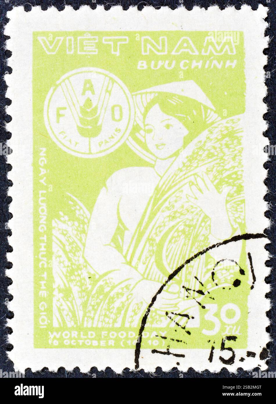 Cancelled postage stamp printed by Vietnam, that shows Woman Holding ...