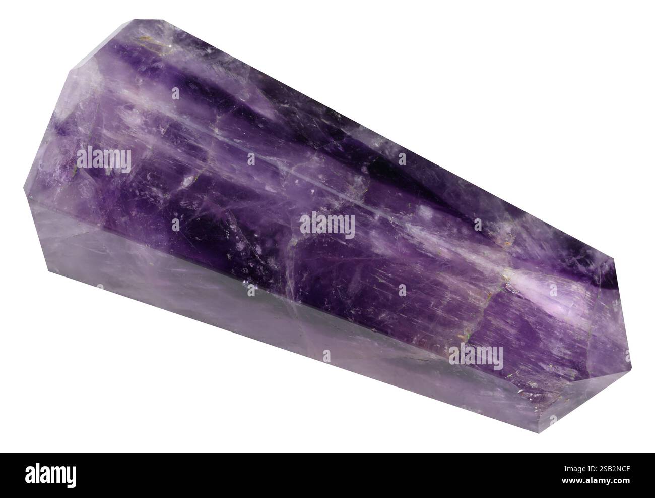 Large purple amethyst in the form of a faceted crystal. Translucent ...