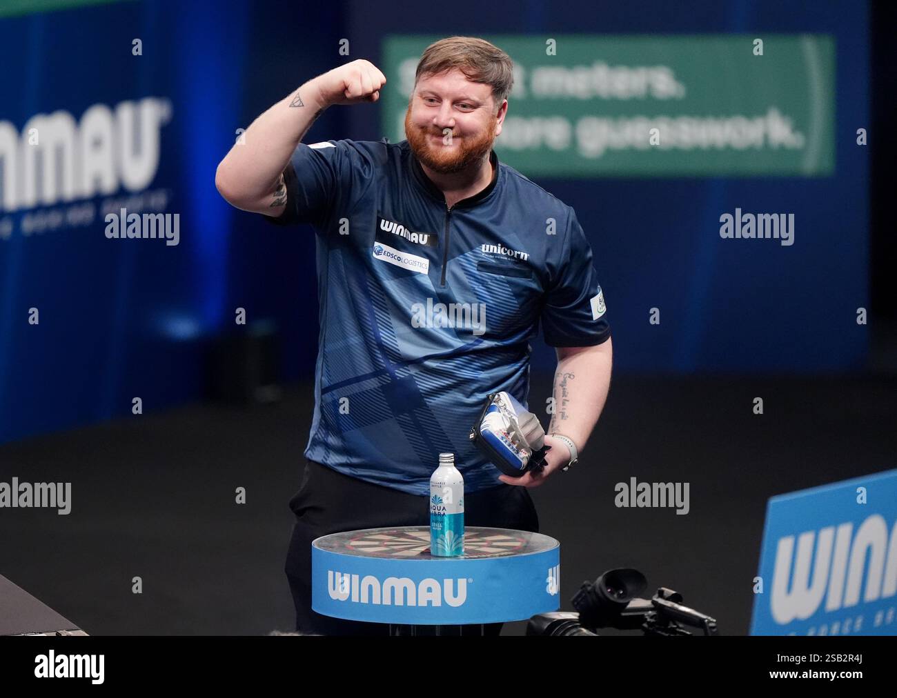 Cameron Menzies celebrates winning his first round match against Dave ...