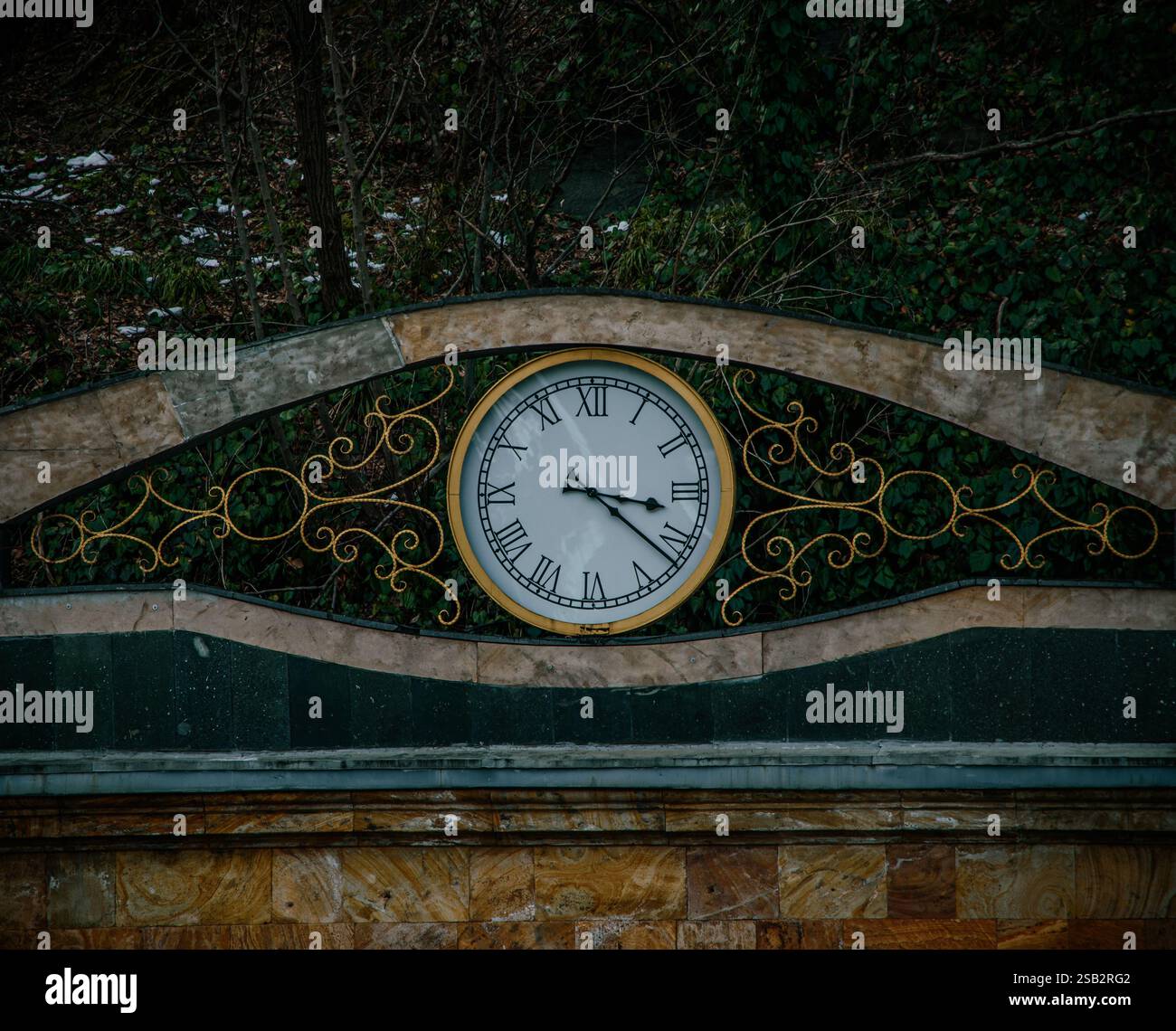 : A vintage decorative clock embedded in a stone archway, evoking a ...