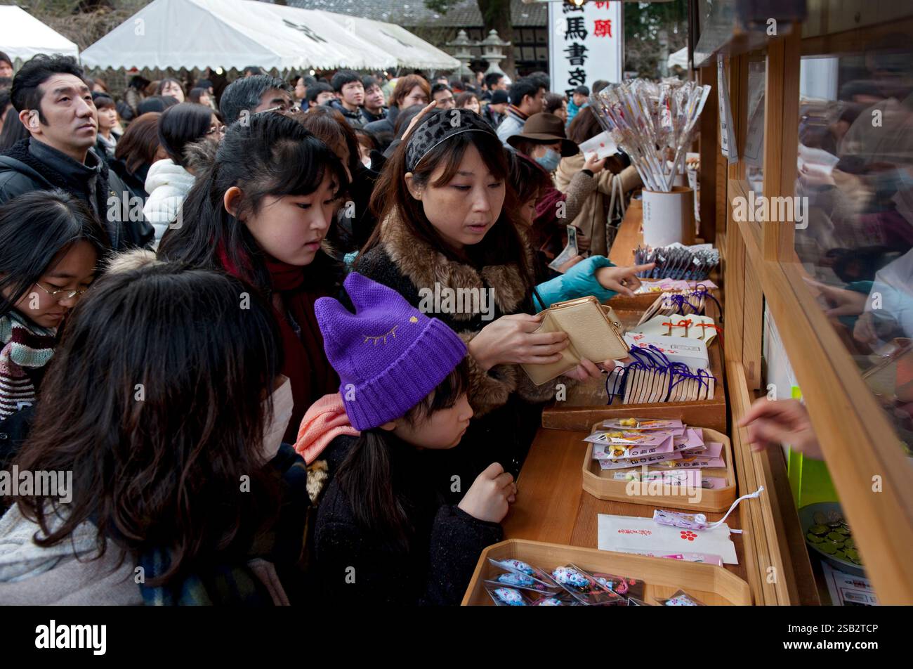 Hatsumode, the first shrine visit of "shogatsu" (New Year), purchasing ...