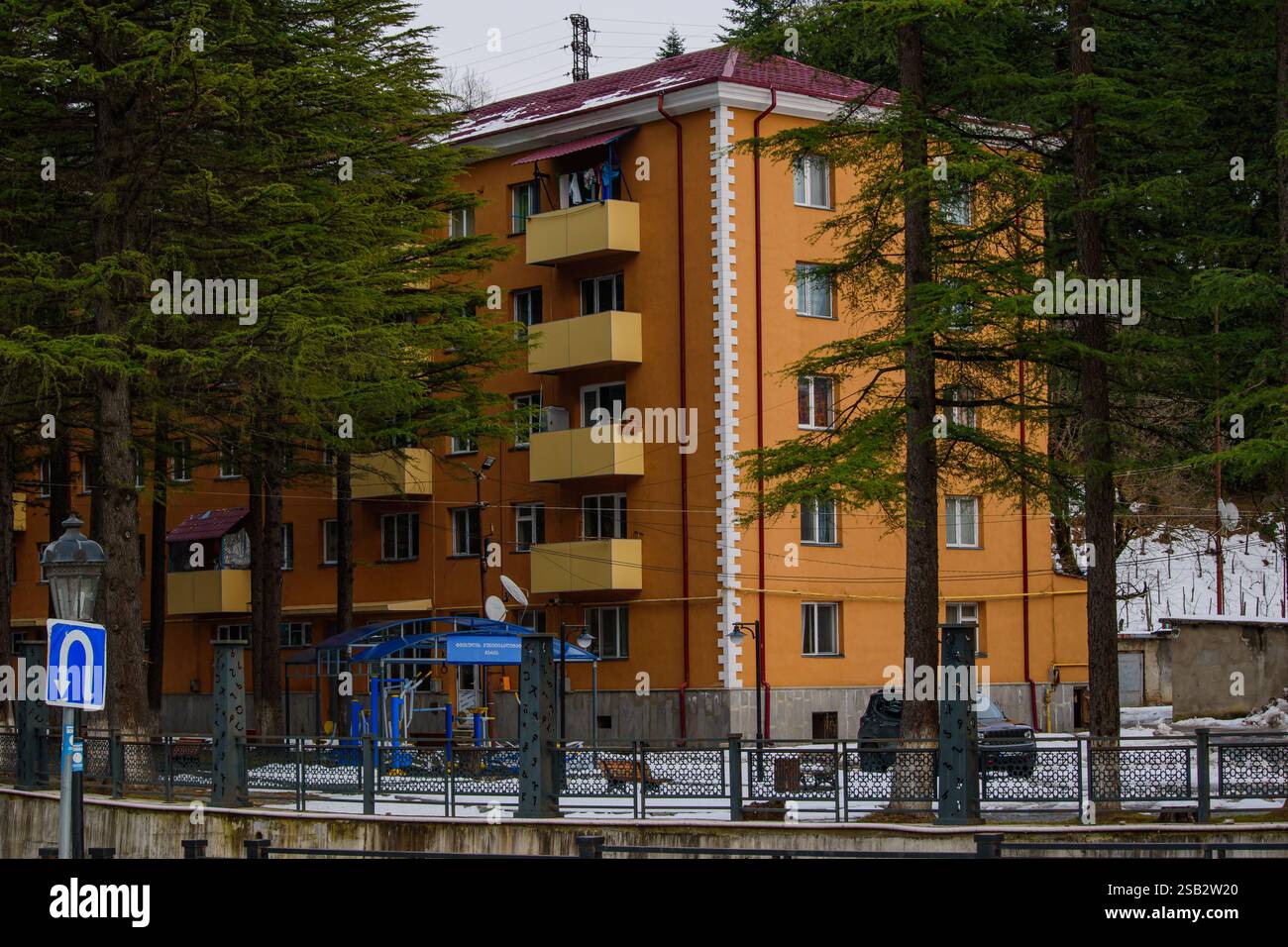A view of modern residential apartments under a blanket of snow ...