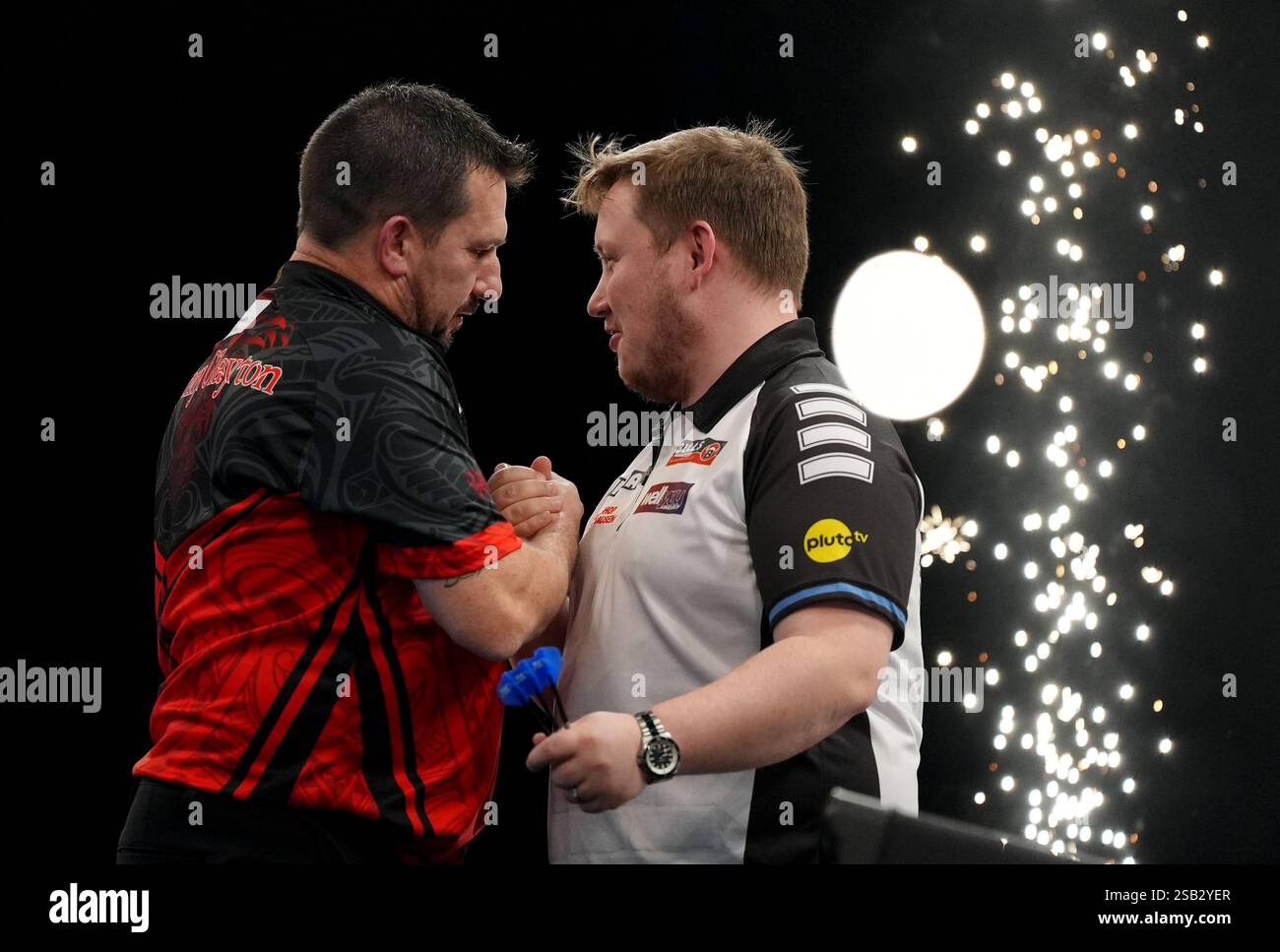 Jonny Clayton celebrates victory during his first round match against ...