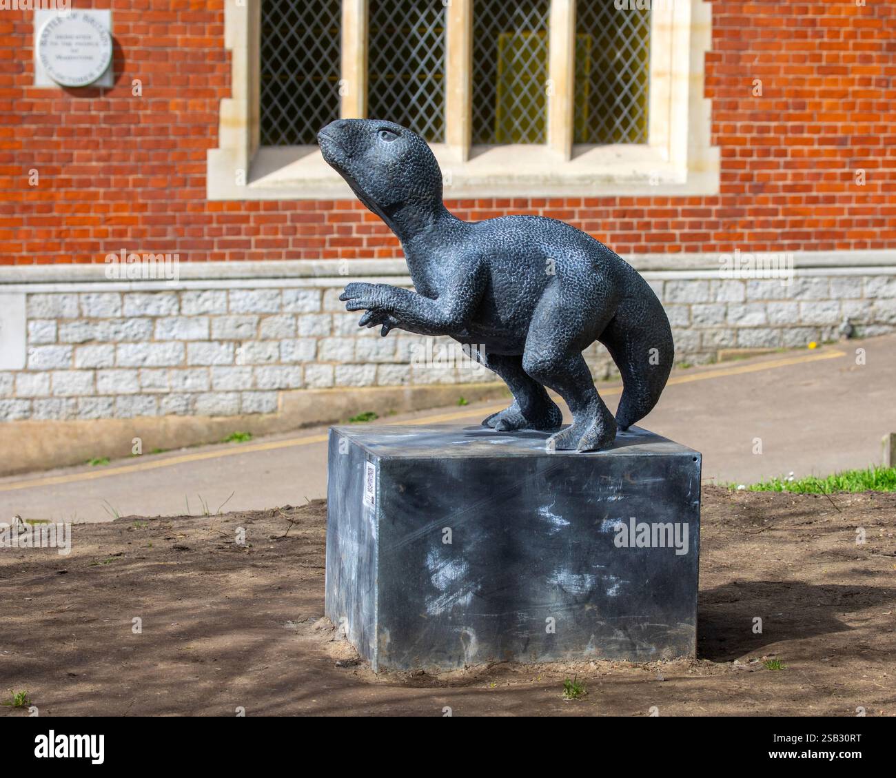 Kent, UK - April 13th 2024: Statue of a baby Iguanodon dinosaur ...